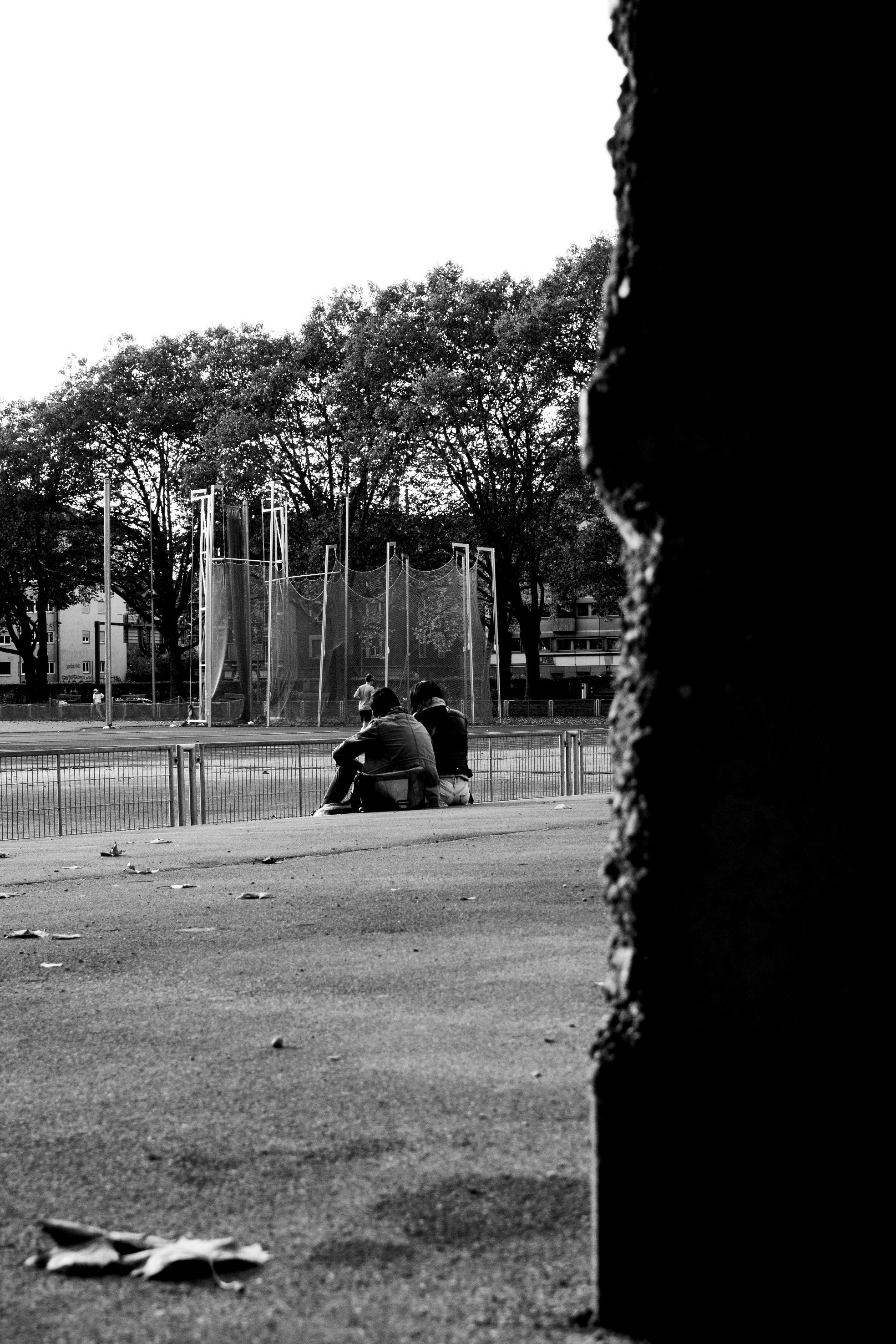 Two Friends at the Edge of the Playground