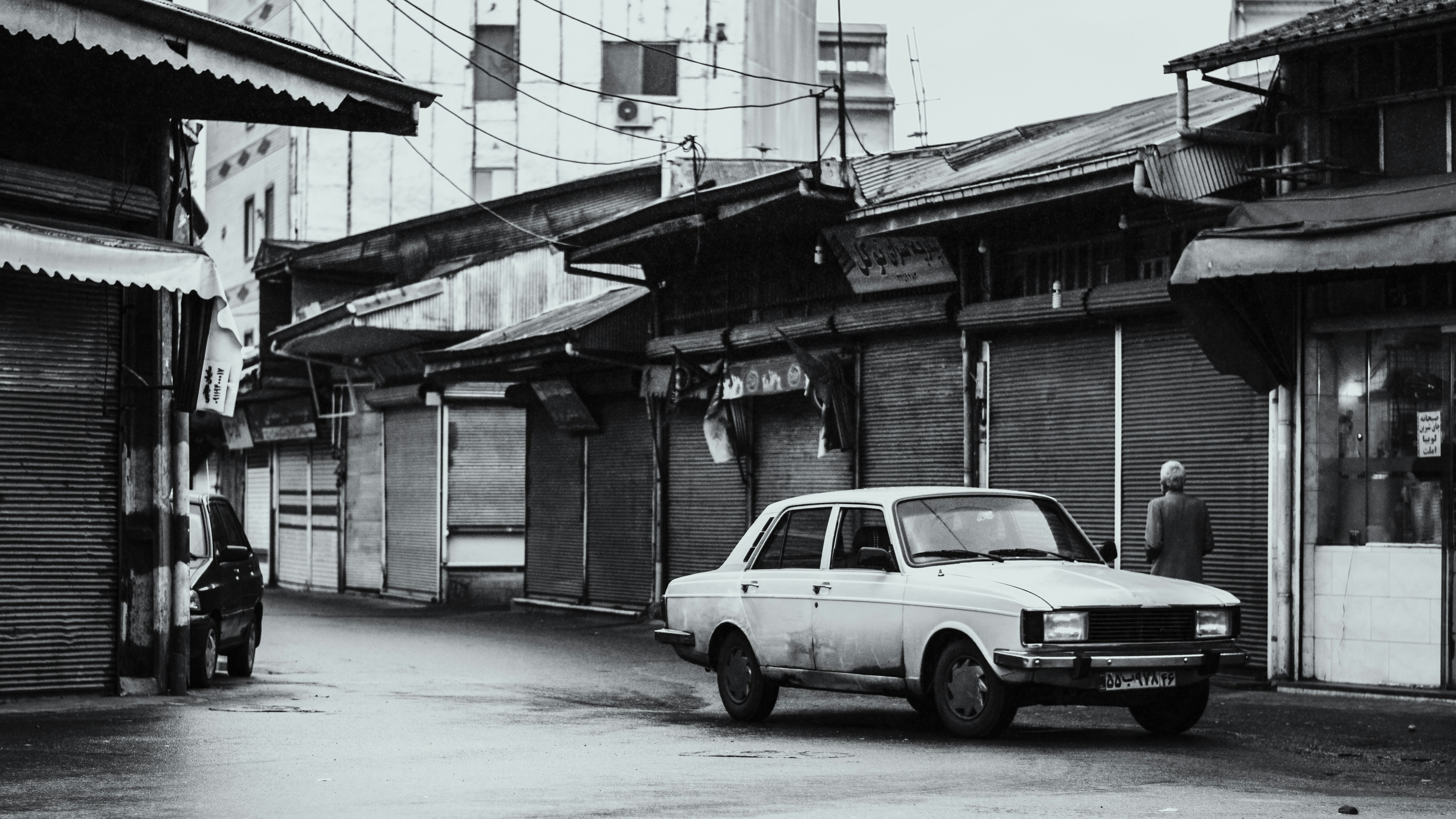 Urban Stillness: A Classic Resting Amidst Modernity