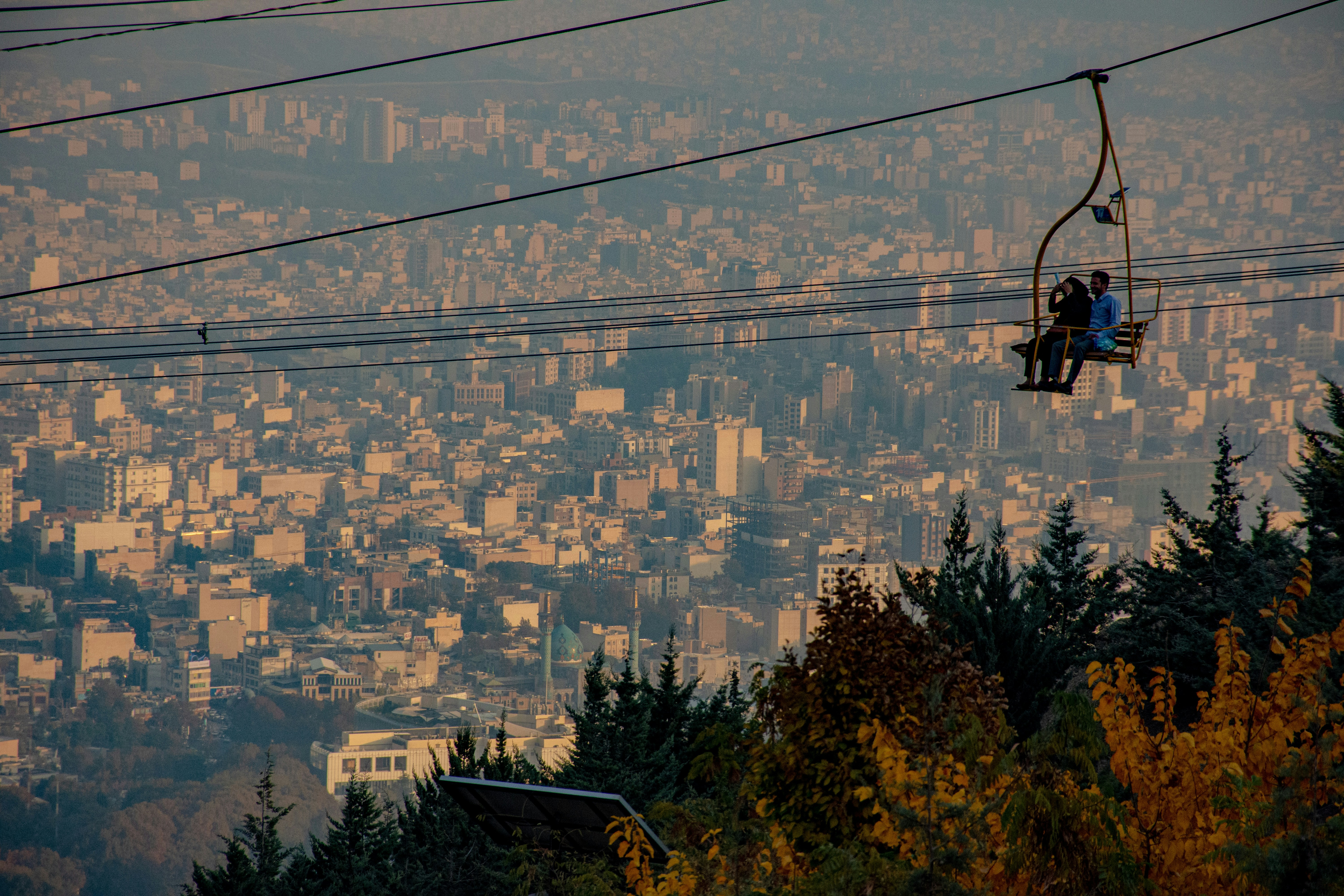 Cable Car Over a Sunset City Canyon