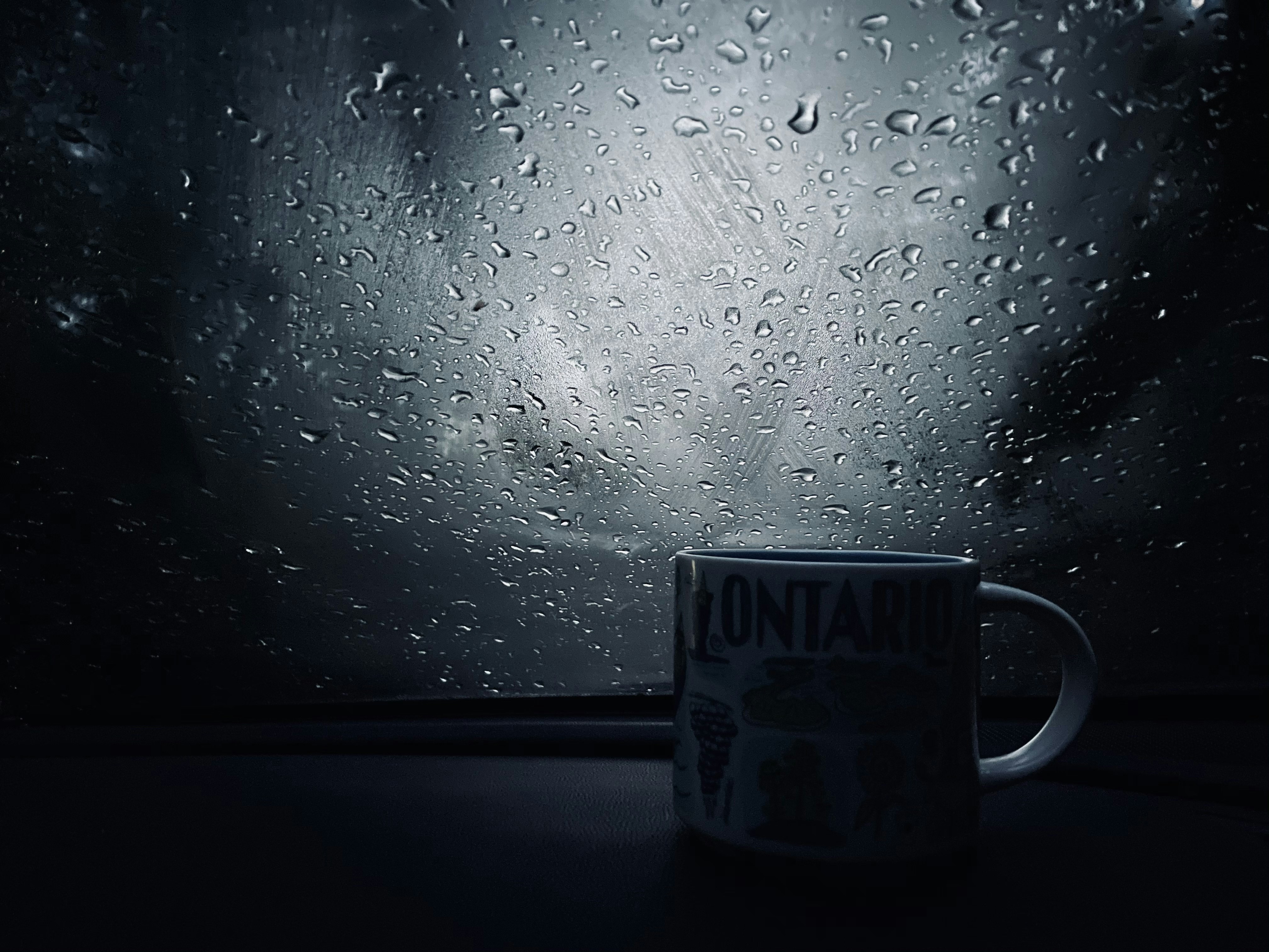white ceramic mug on table