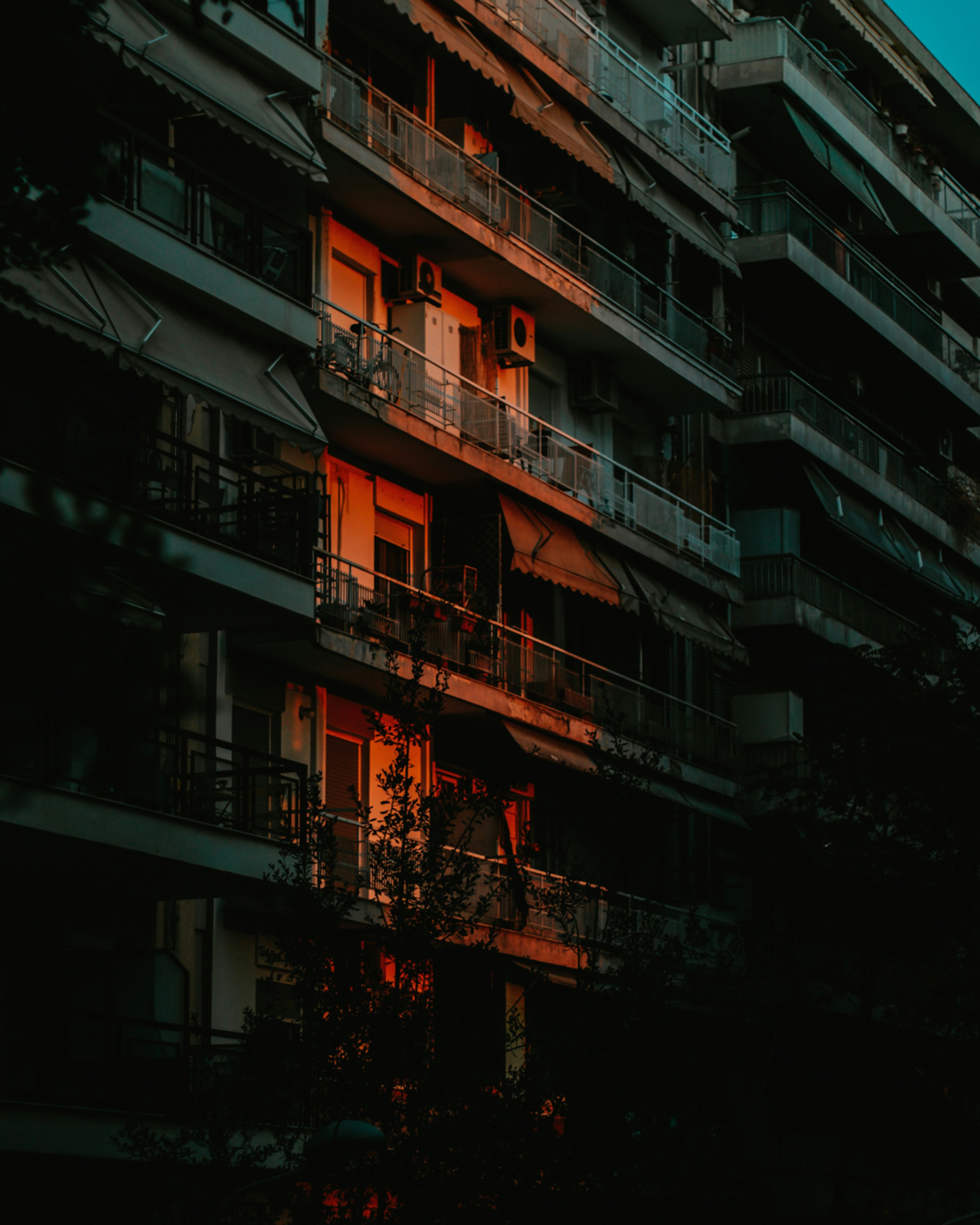 red and white concrete building during night time