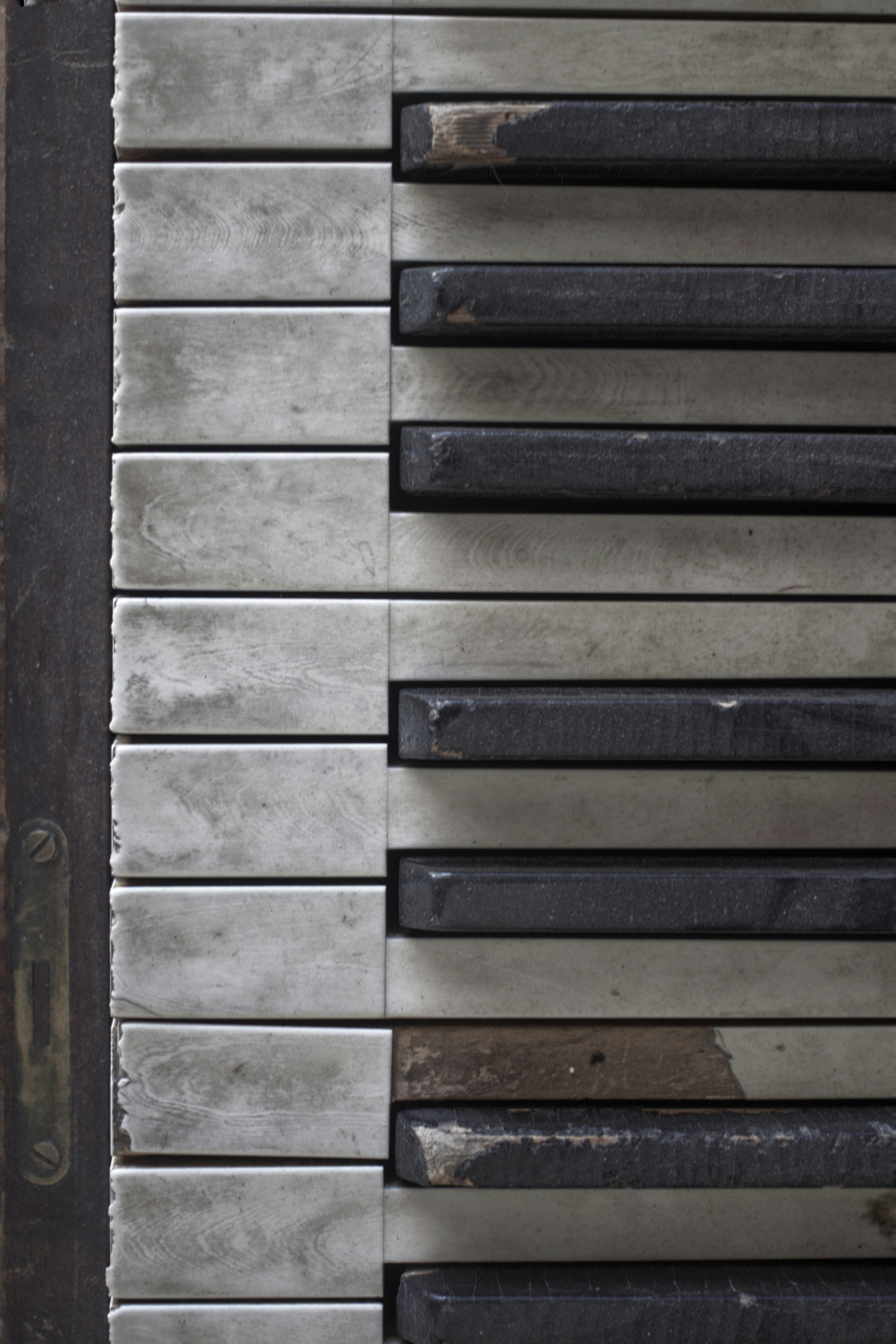 Ivory Echoes: A Close-Up of Weathered Piano Keys
