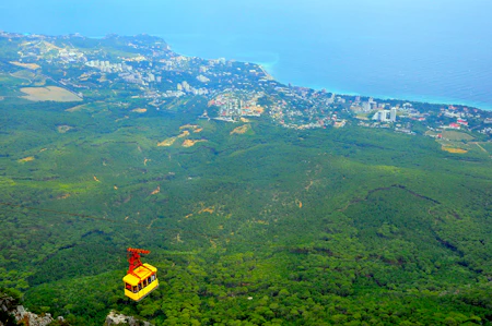 Vibrant Ascent Over Green Valleys