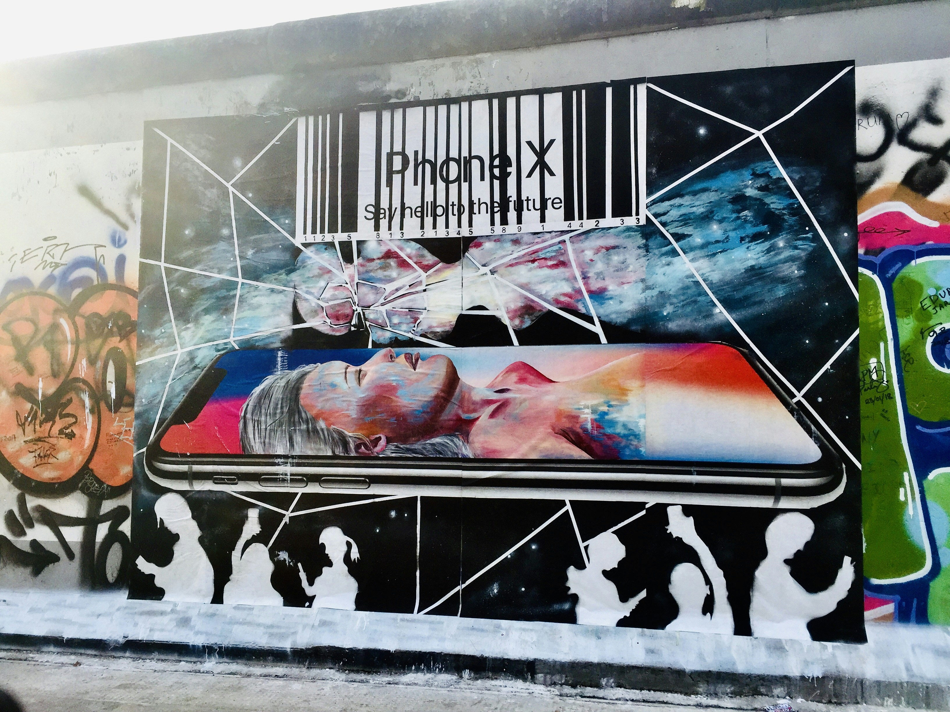 Centerstage on Concrete: An iPhone Ad Framed by Urban Graffiti