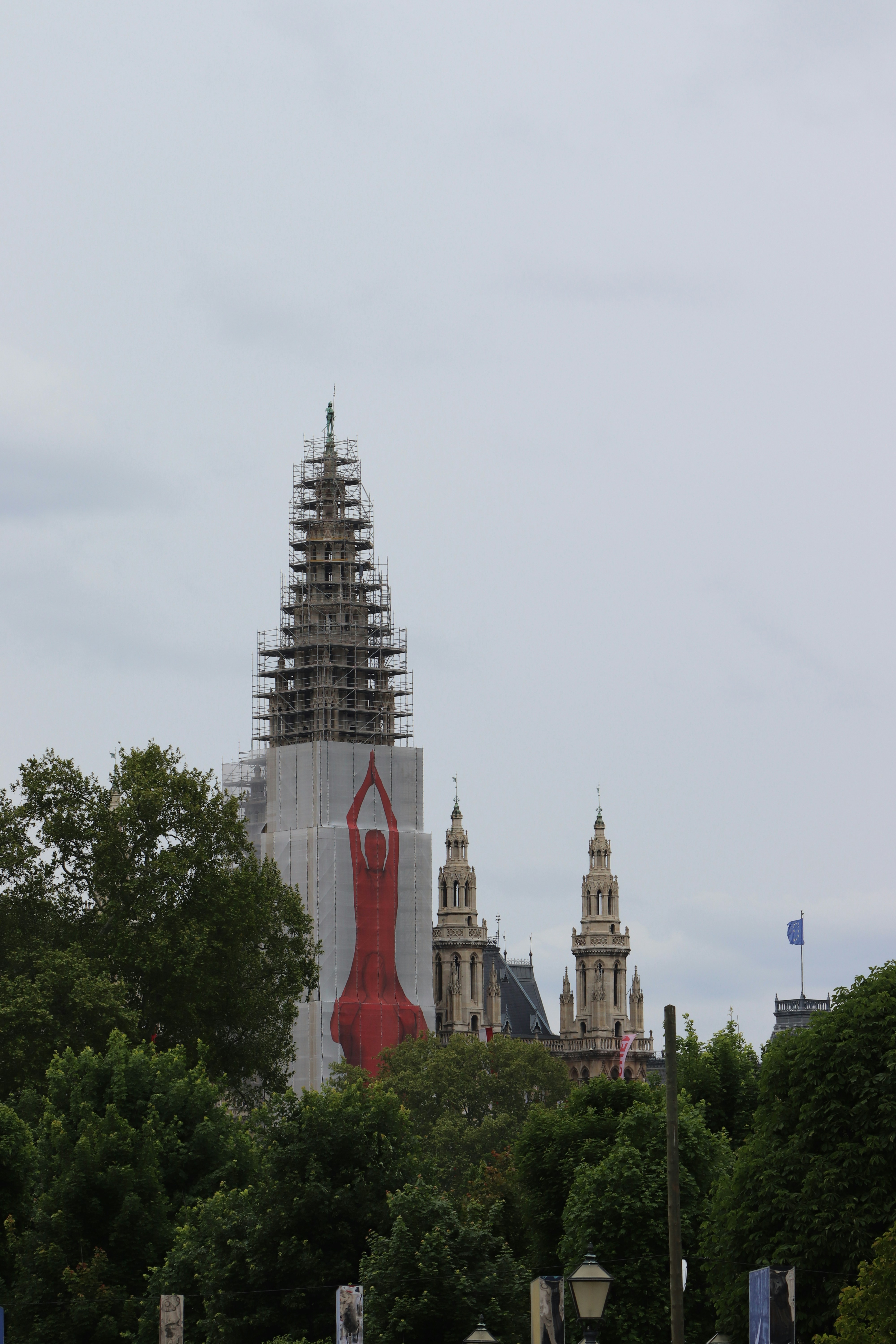 Rising with Red: a scaffolded spire punctuates the skyline