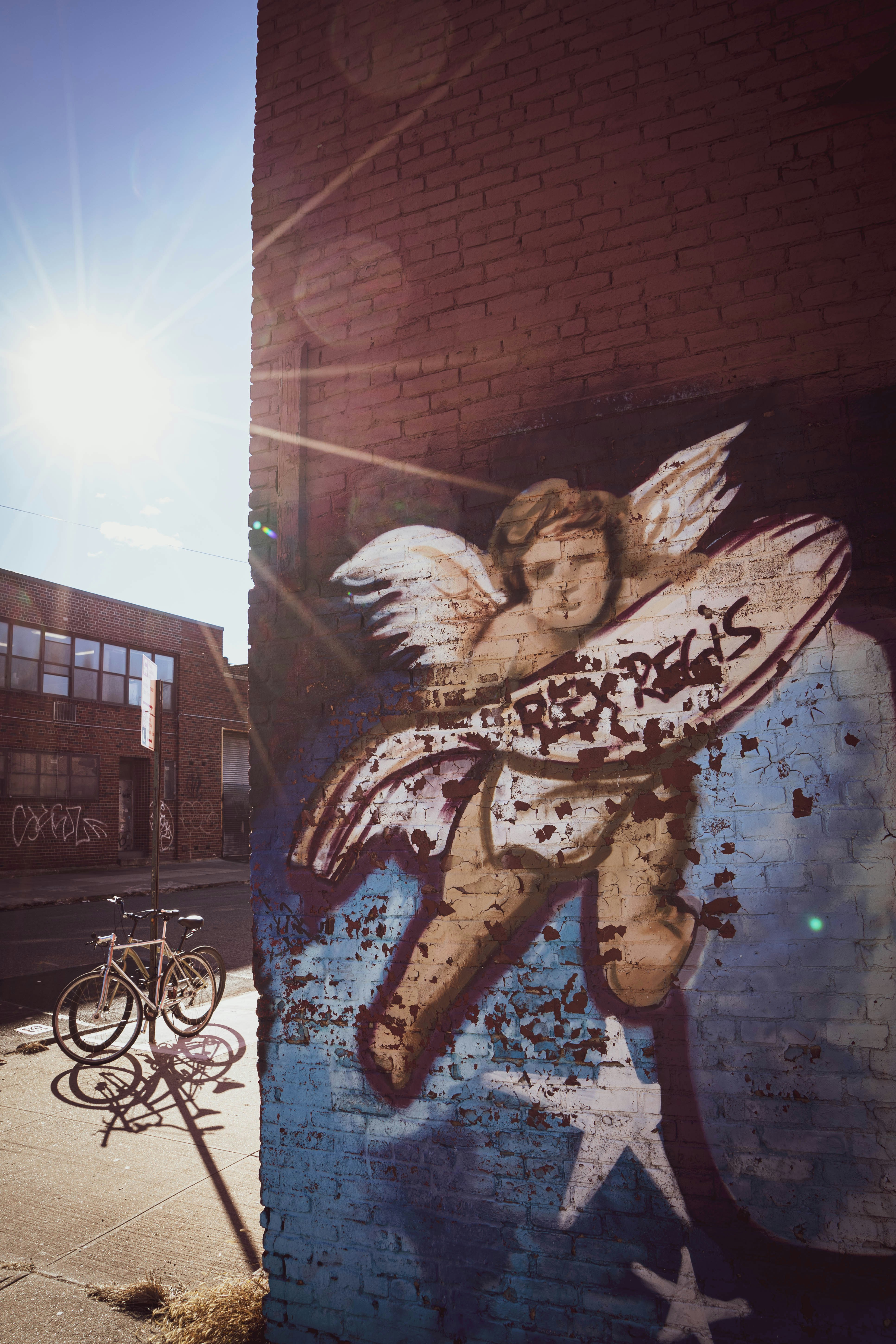 Cupid’s Angel Graffiti Bathed in Morning Sun