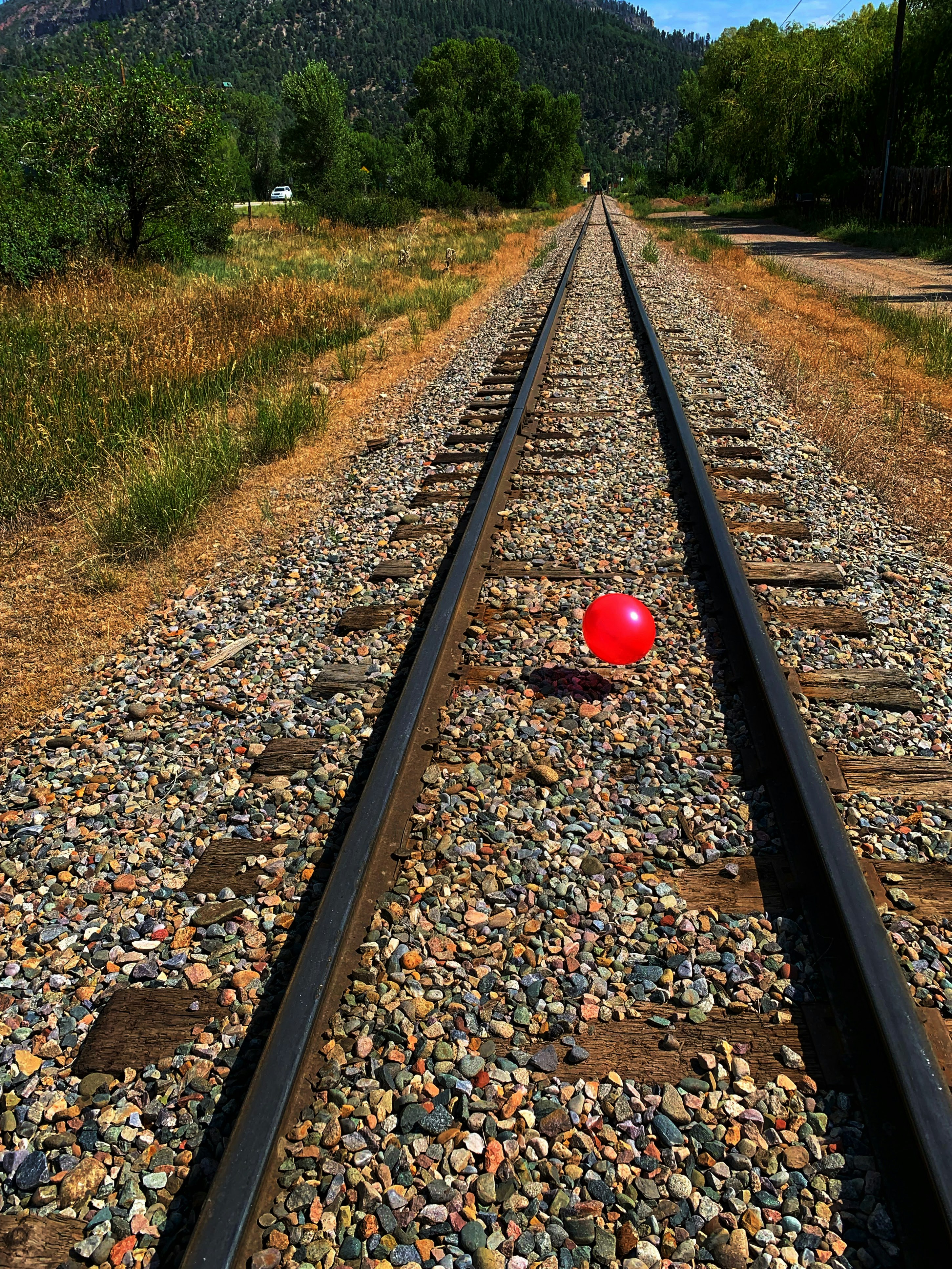 red ball on train rail