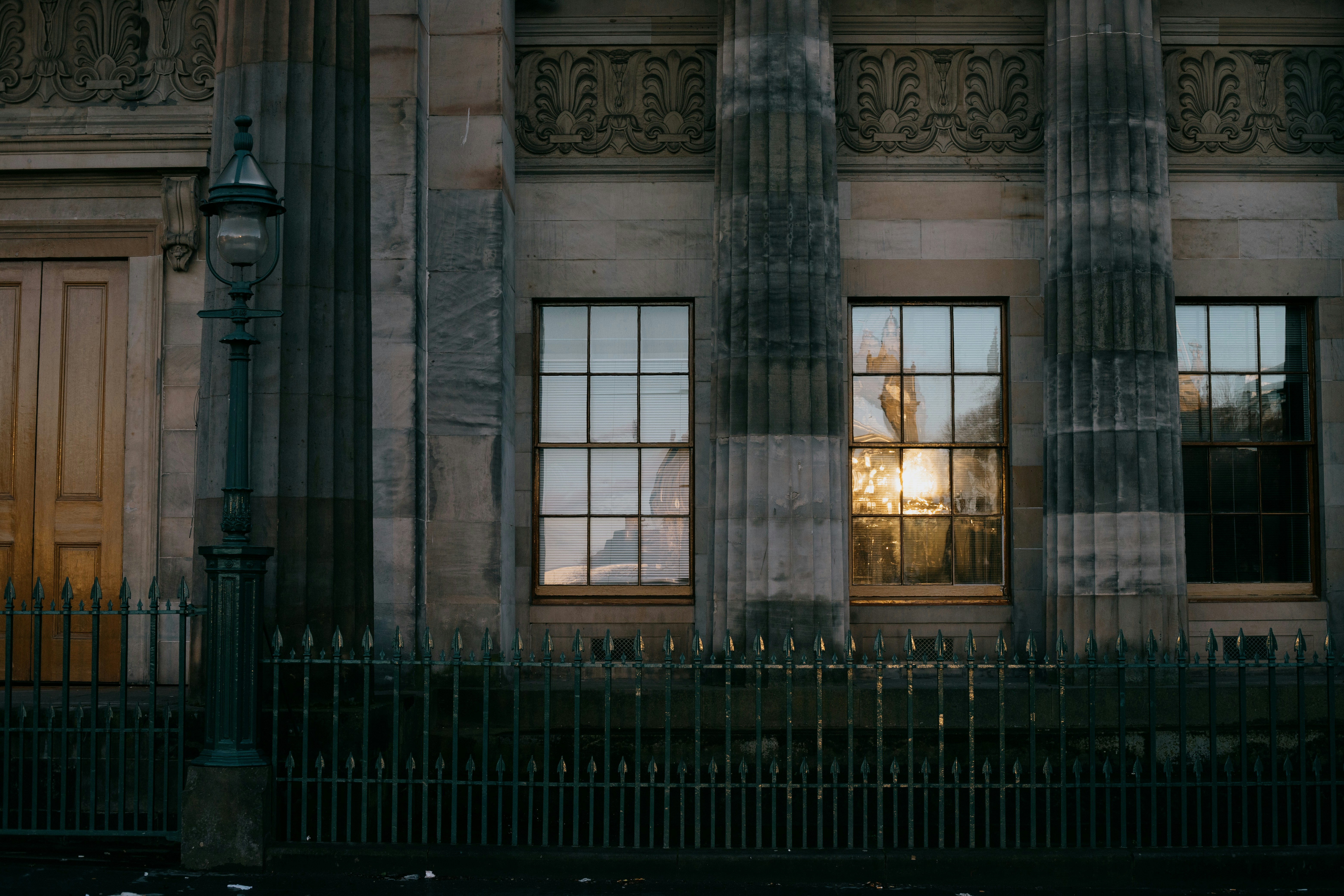 Sunlit Reflections on Classical Facade