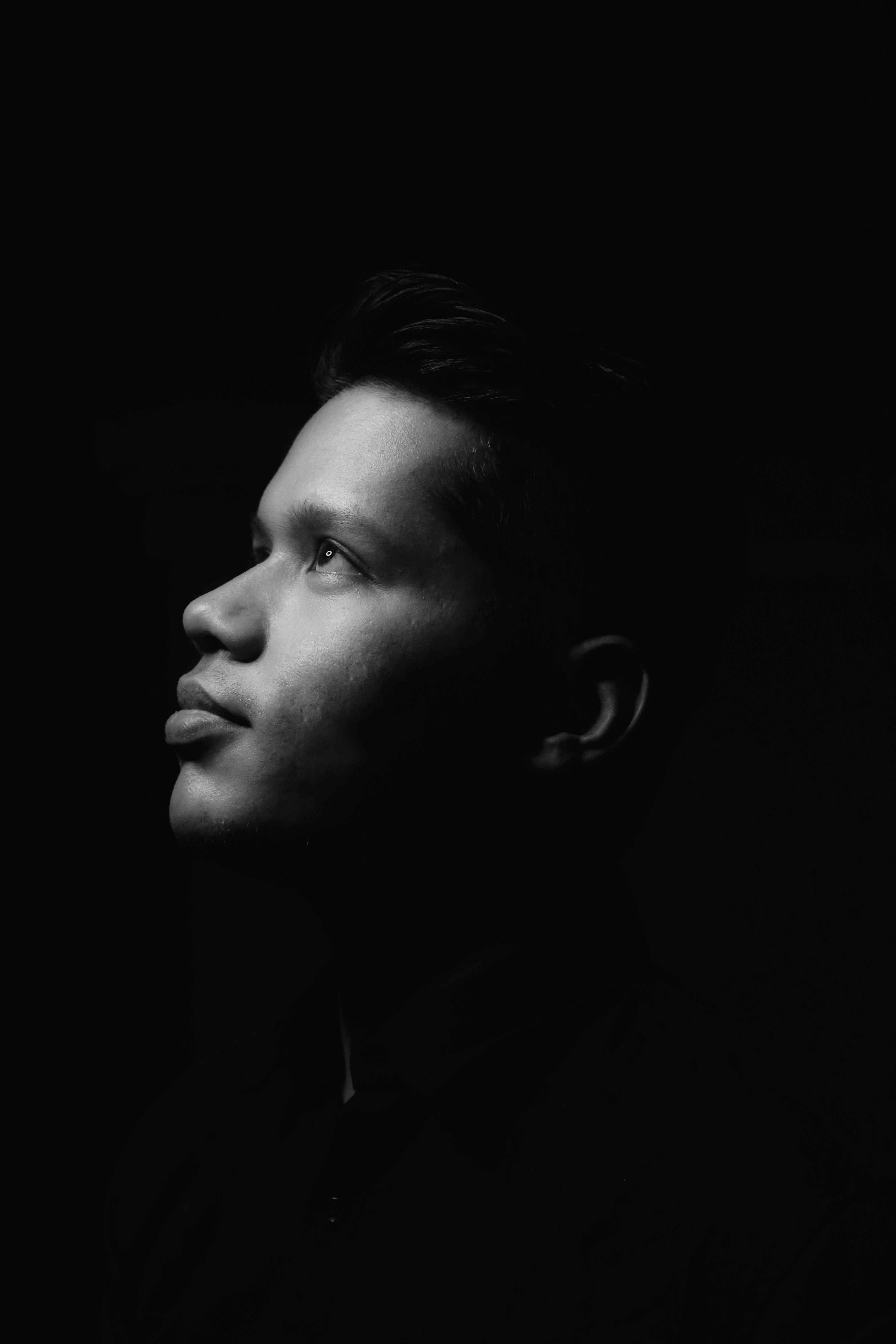 Edge of Light: A Profile Lit by a Single Quiet Beam