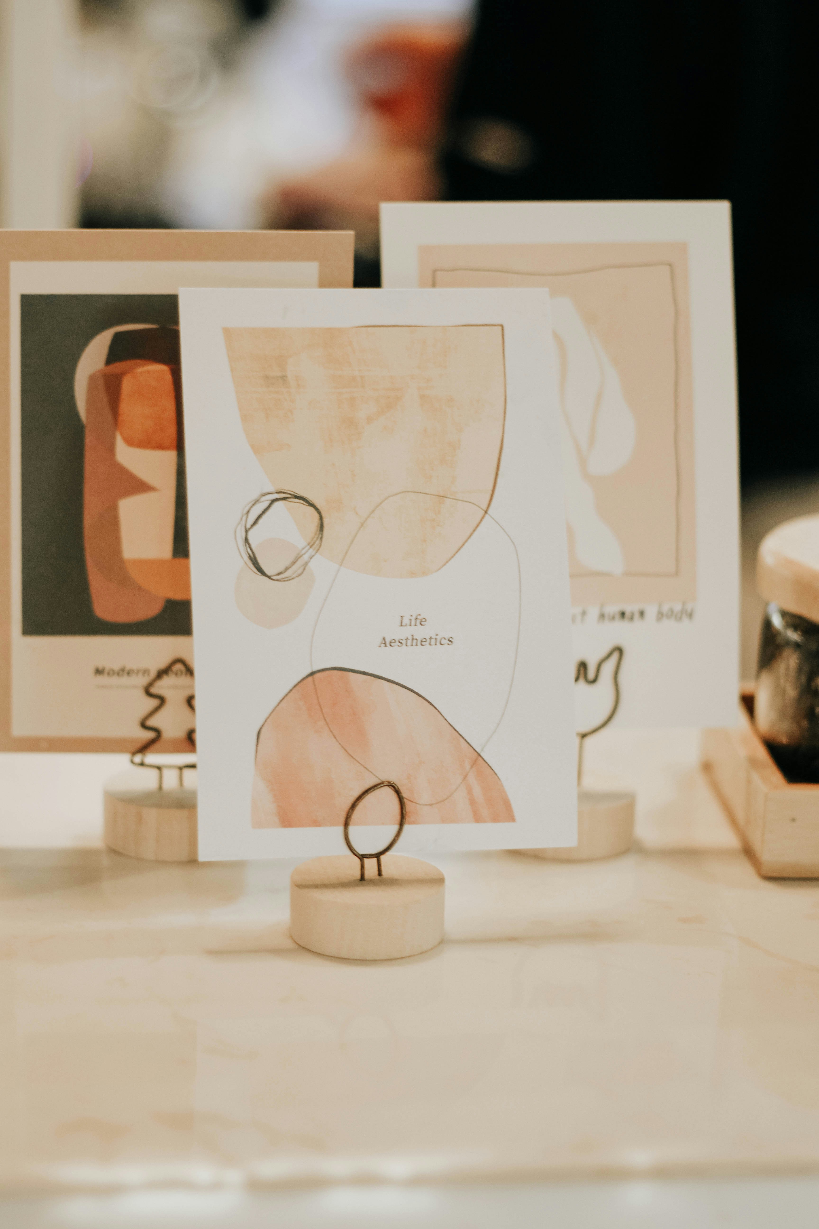 Pastel Abstractions: Central Card Art on a Quiet Table