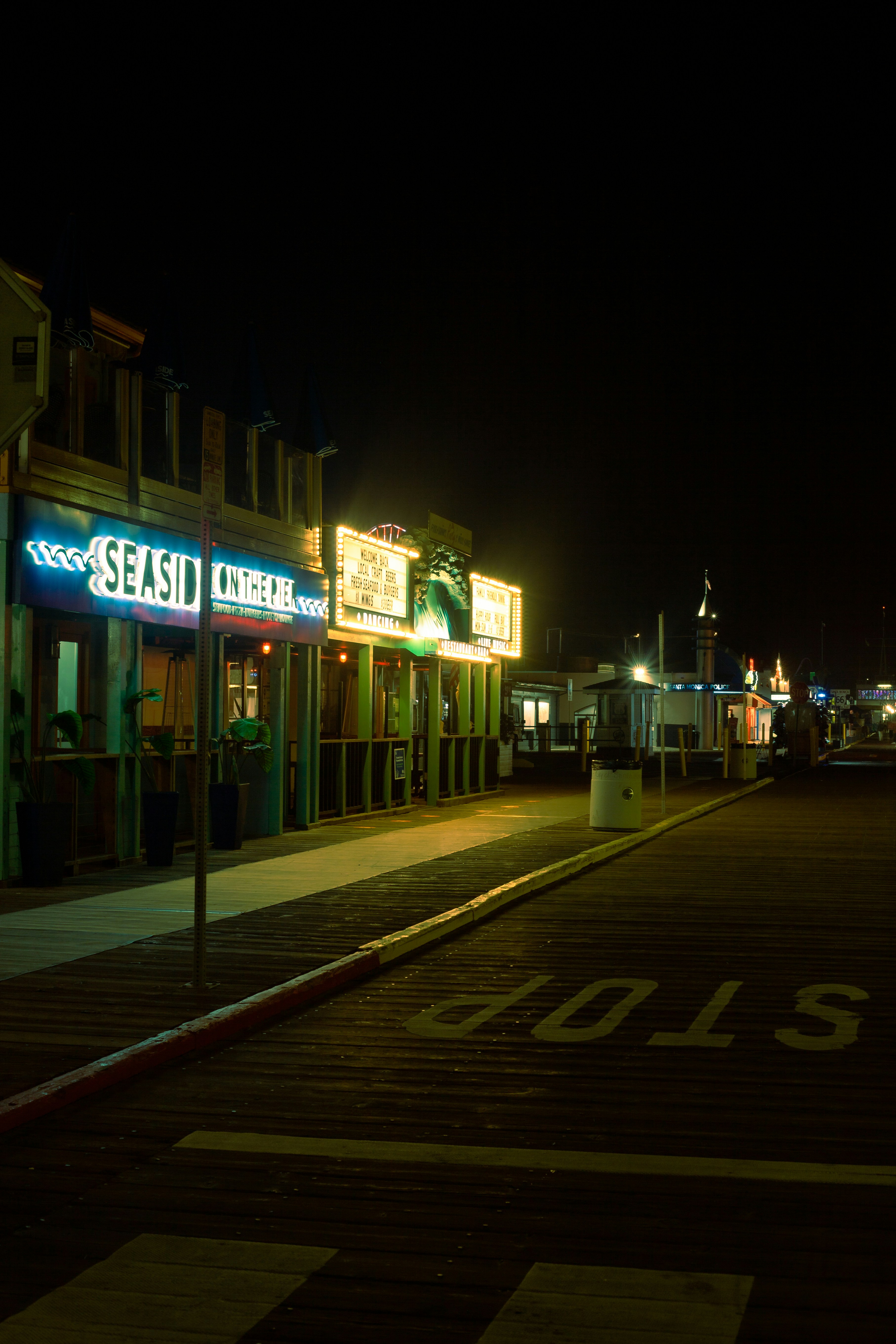 Blue and white store signage during night time photo – Free Path Image ...