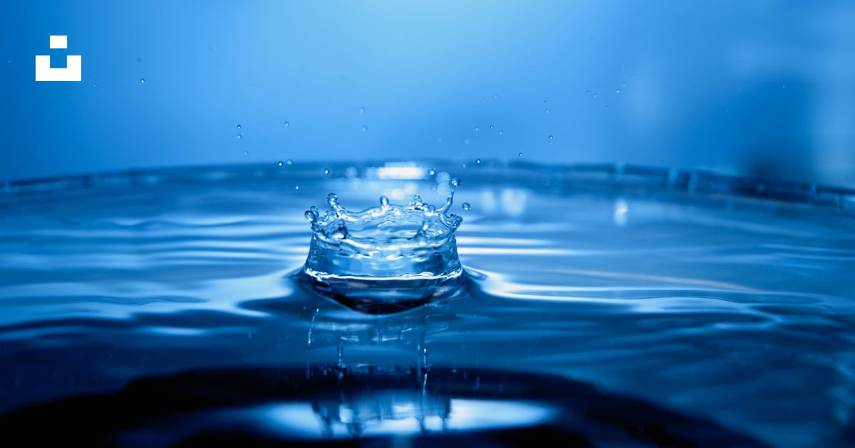 Clear Glass Cup On Water Photo Free Blue Image On Unsplash
