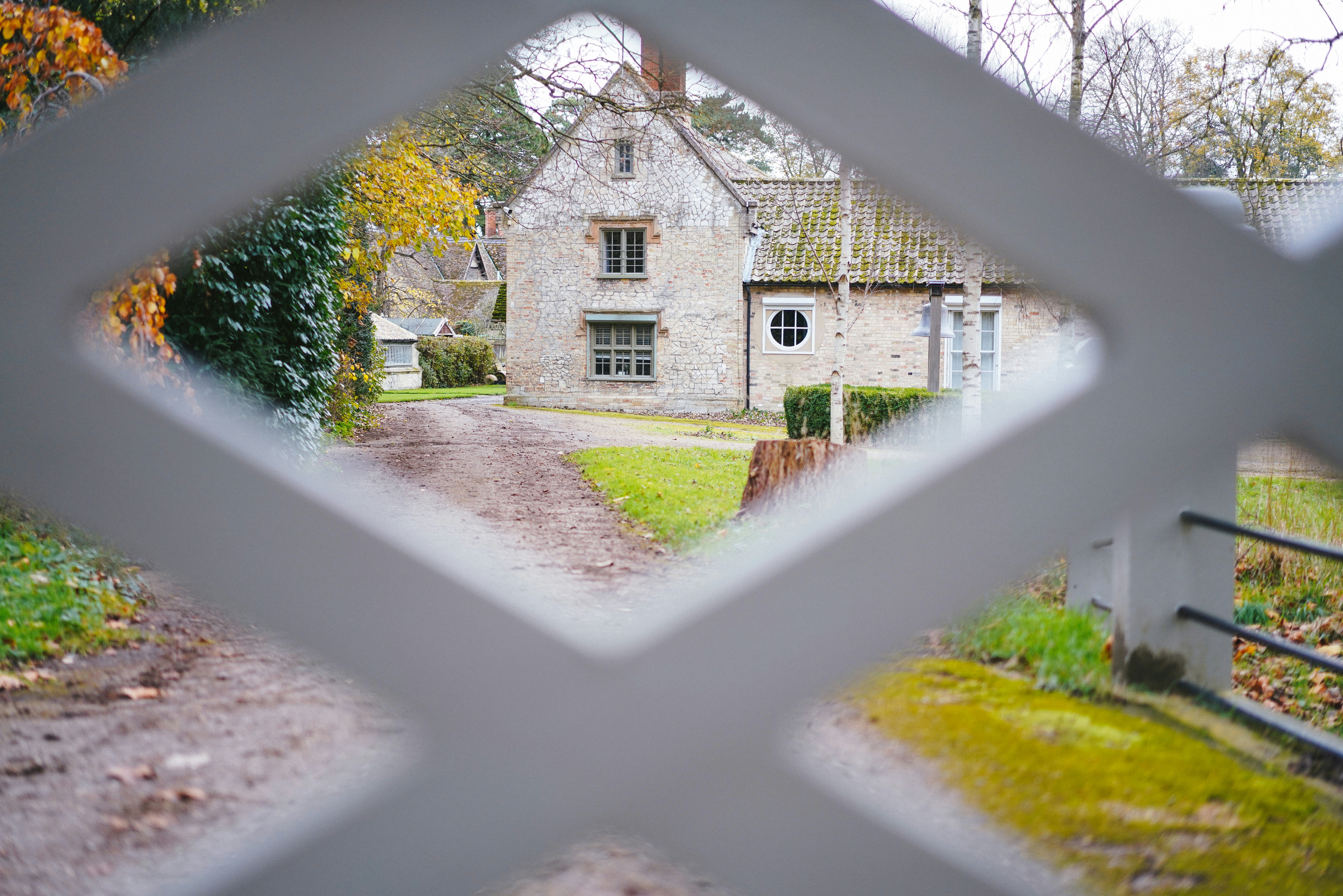 Diamond-Framed Autumn: A Cottage Hidden Beyond the Lattice