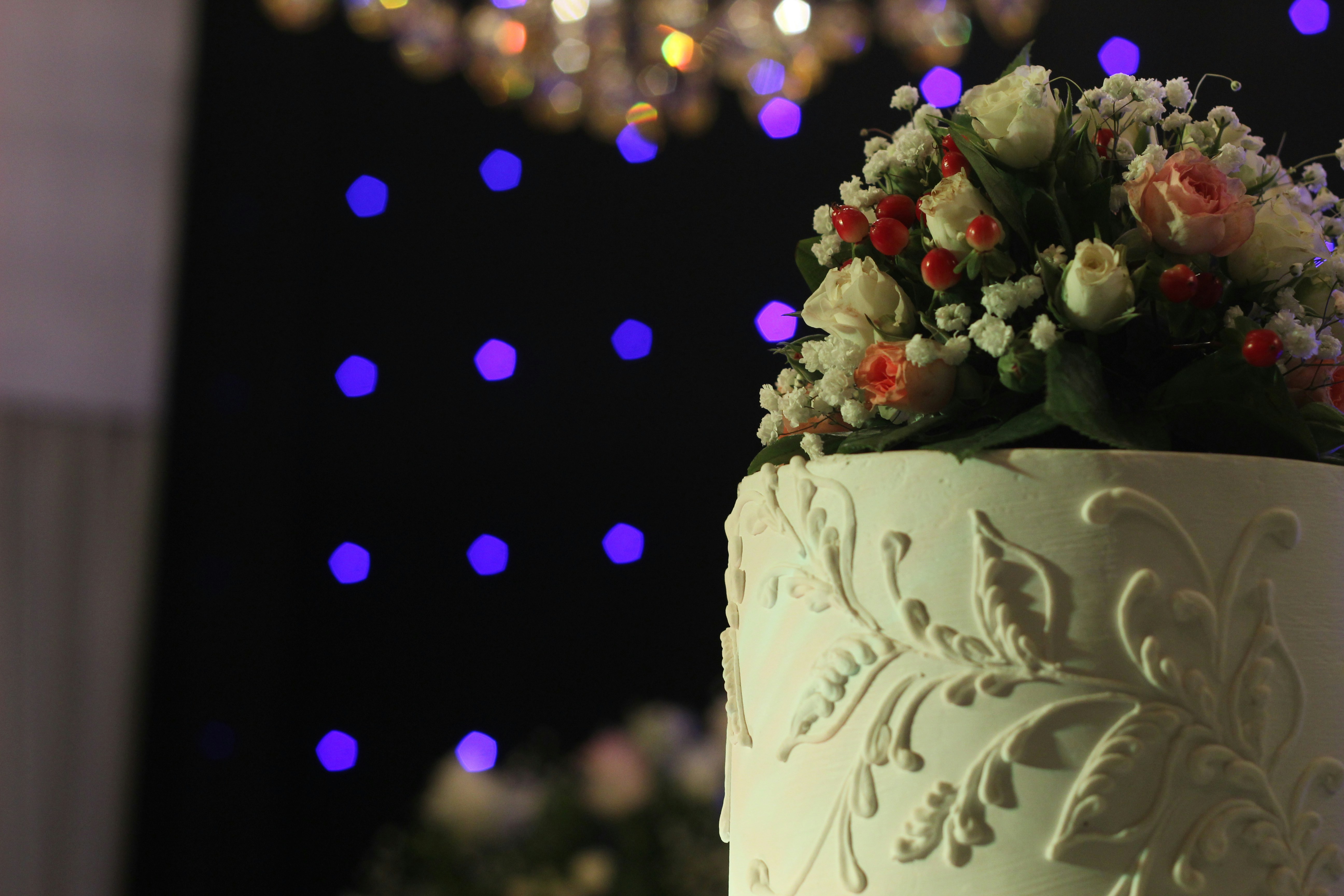 Ornate Cake Tiers, Floral Crown in Soft Spotlight