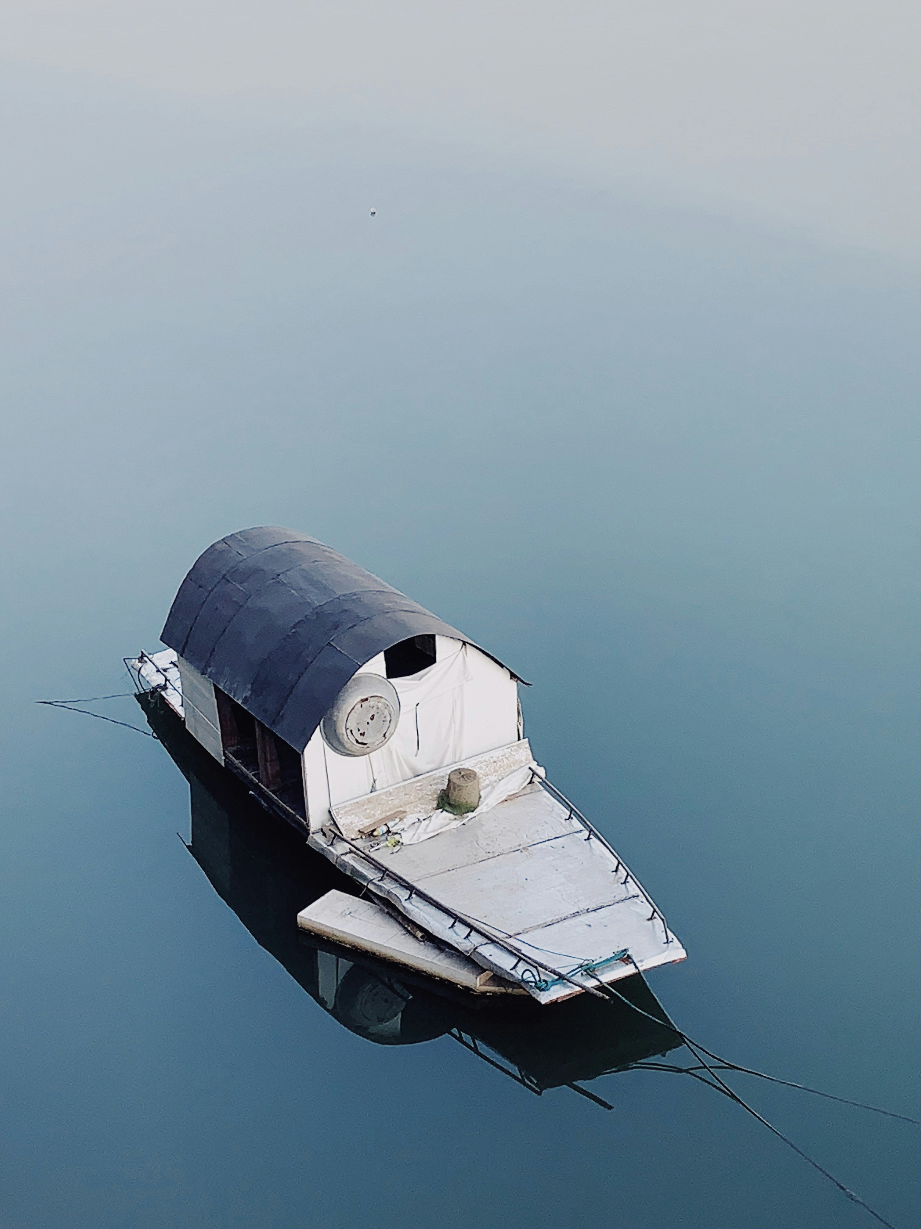 white and black ship on sea during daytime