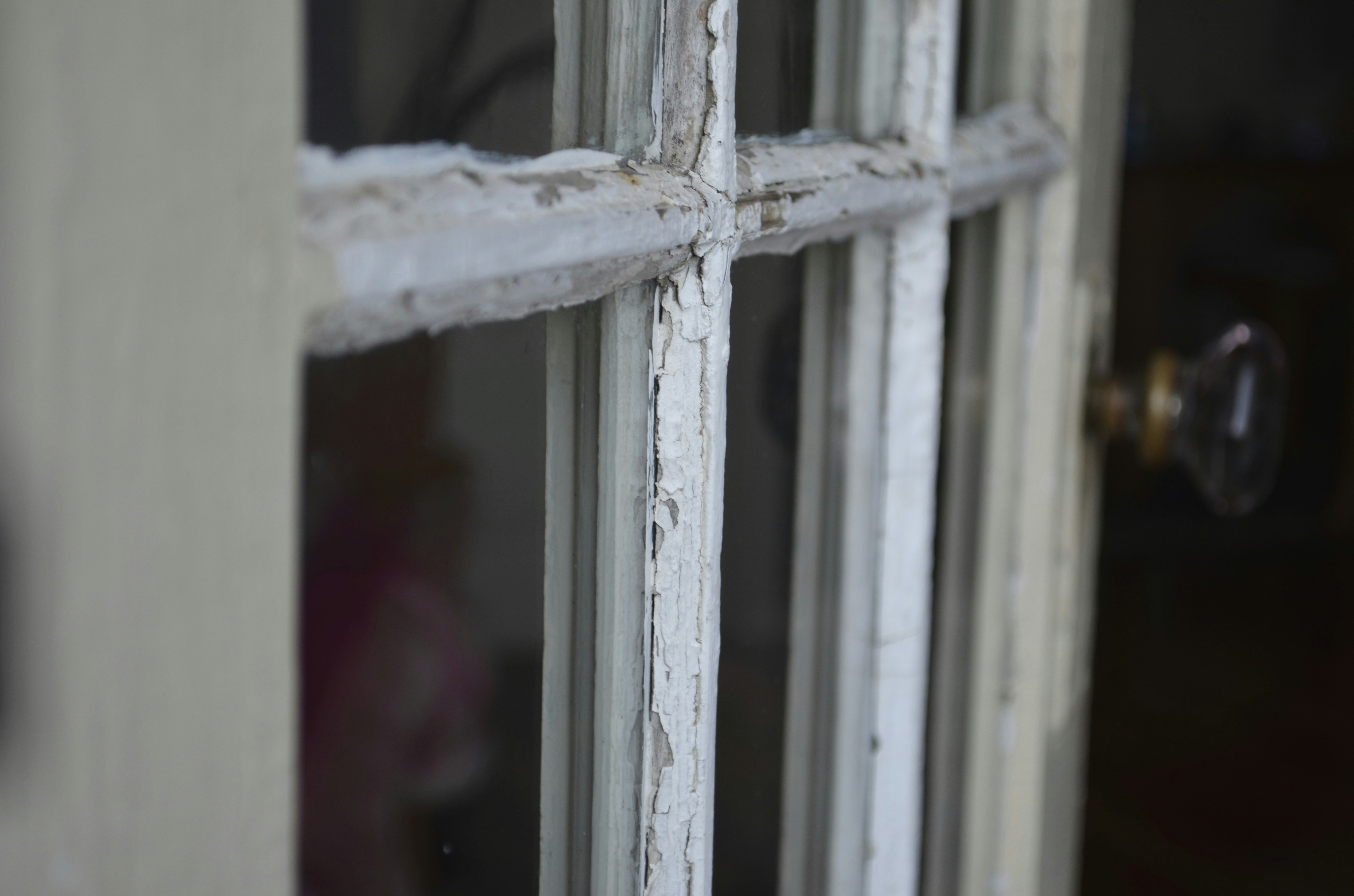 white wooden framed glass window