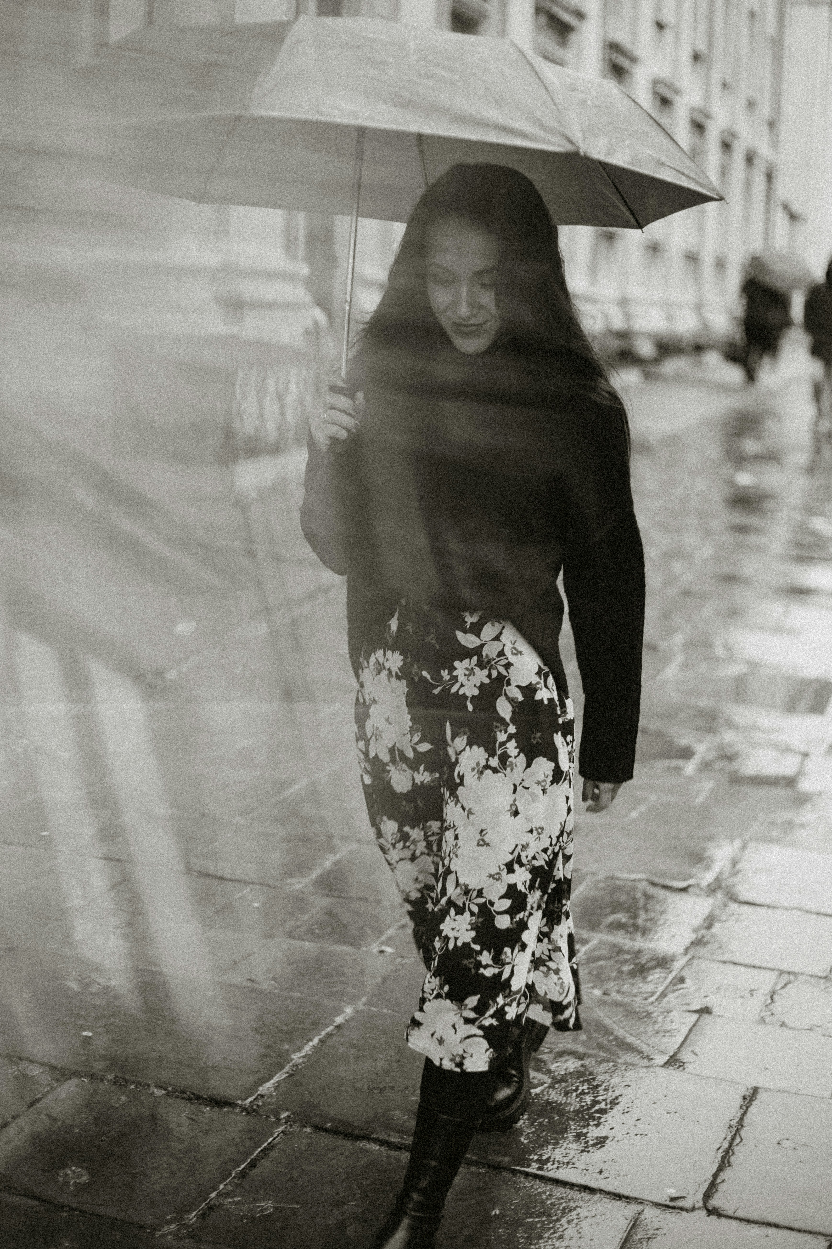 Umbrella in the Rain: A Quiet Walk Through the Wet Street
