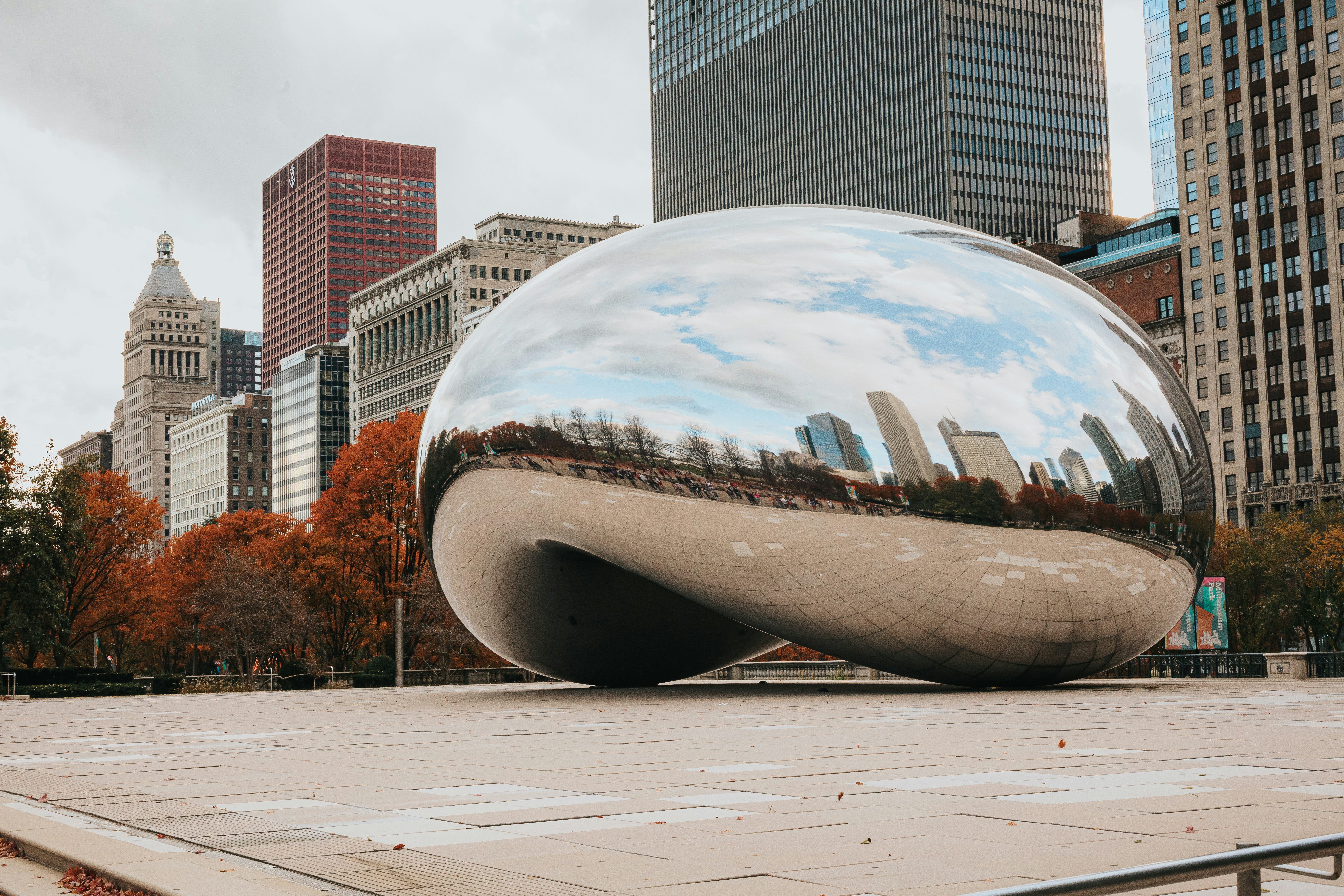 Chromed Skyline: The Bean Reflects Chicago Amid Autumn Light