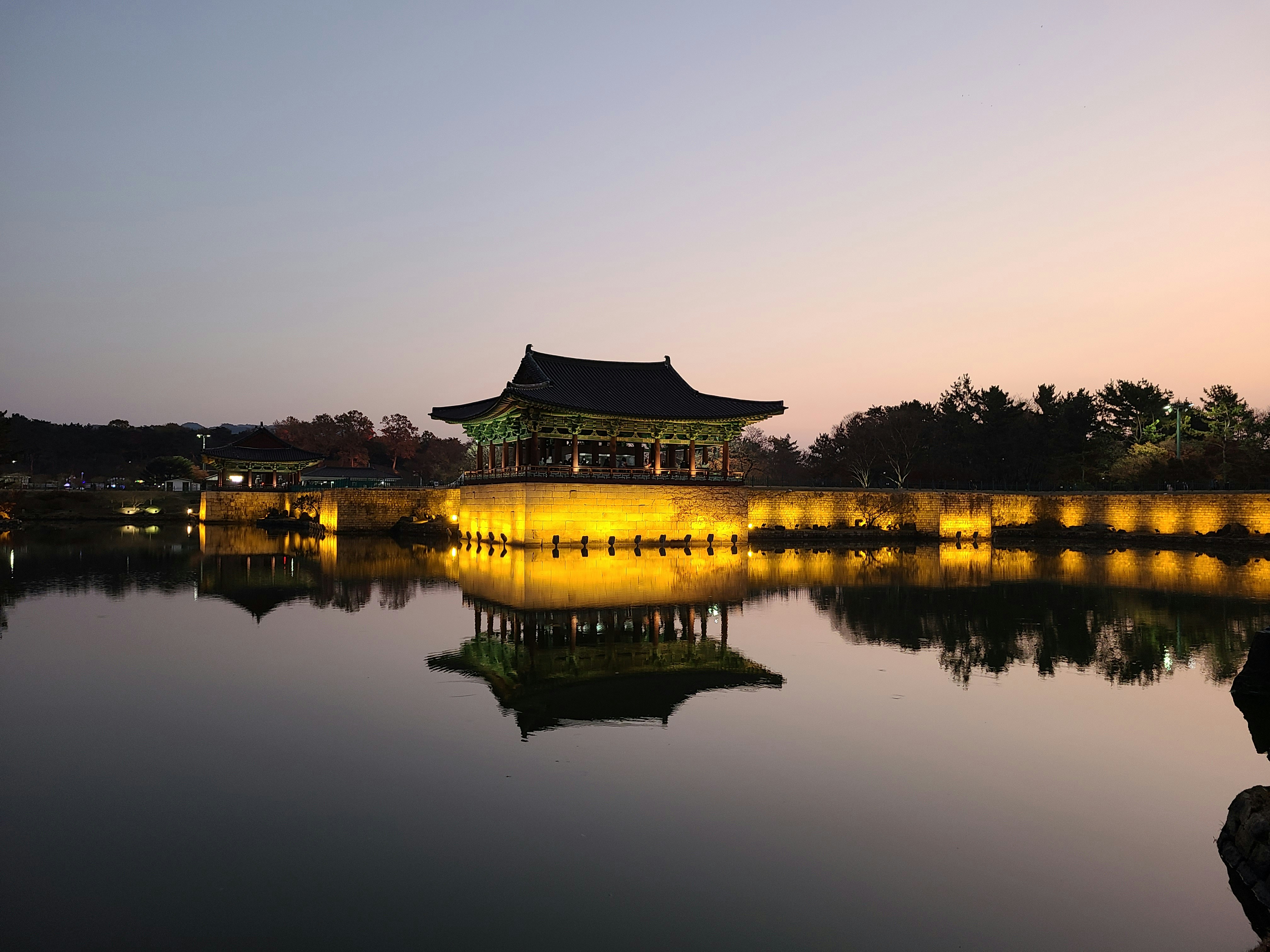 Green and brown temple near body of water during daytime photo – Free ...