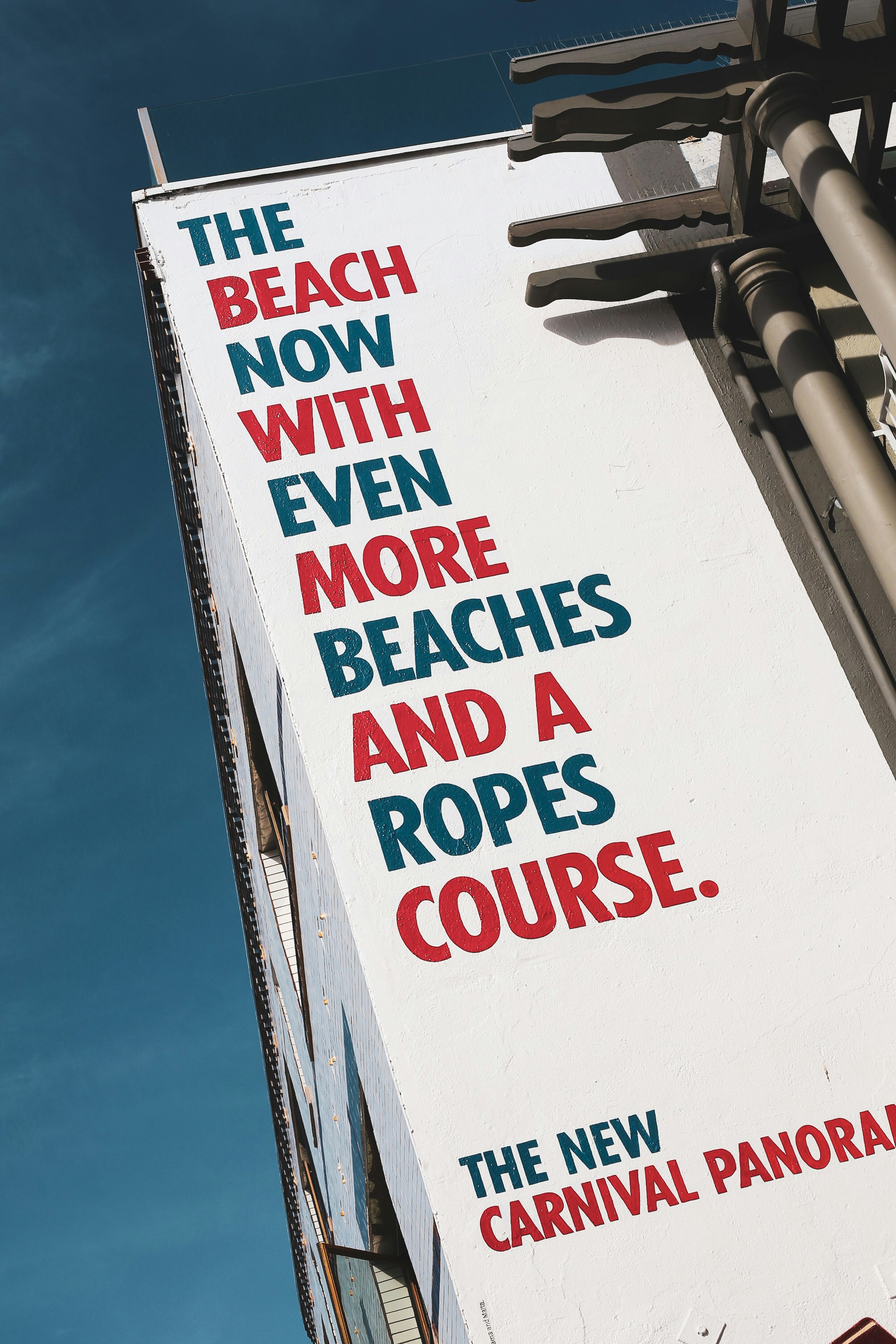Sign of Endless Beaches: A Tilted Carnival Panorama Banner