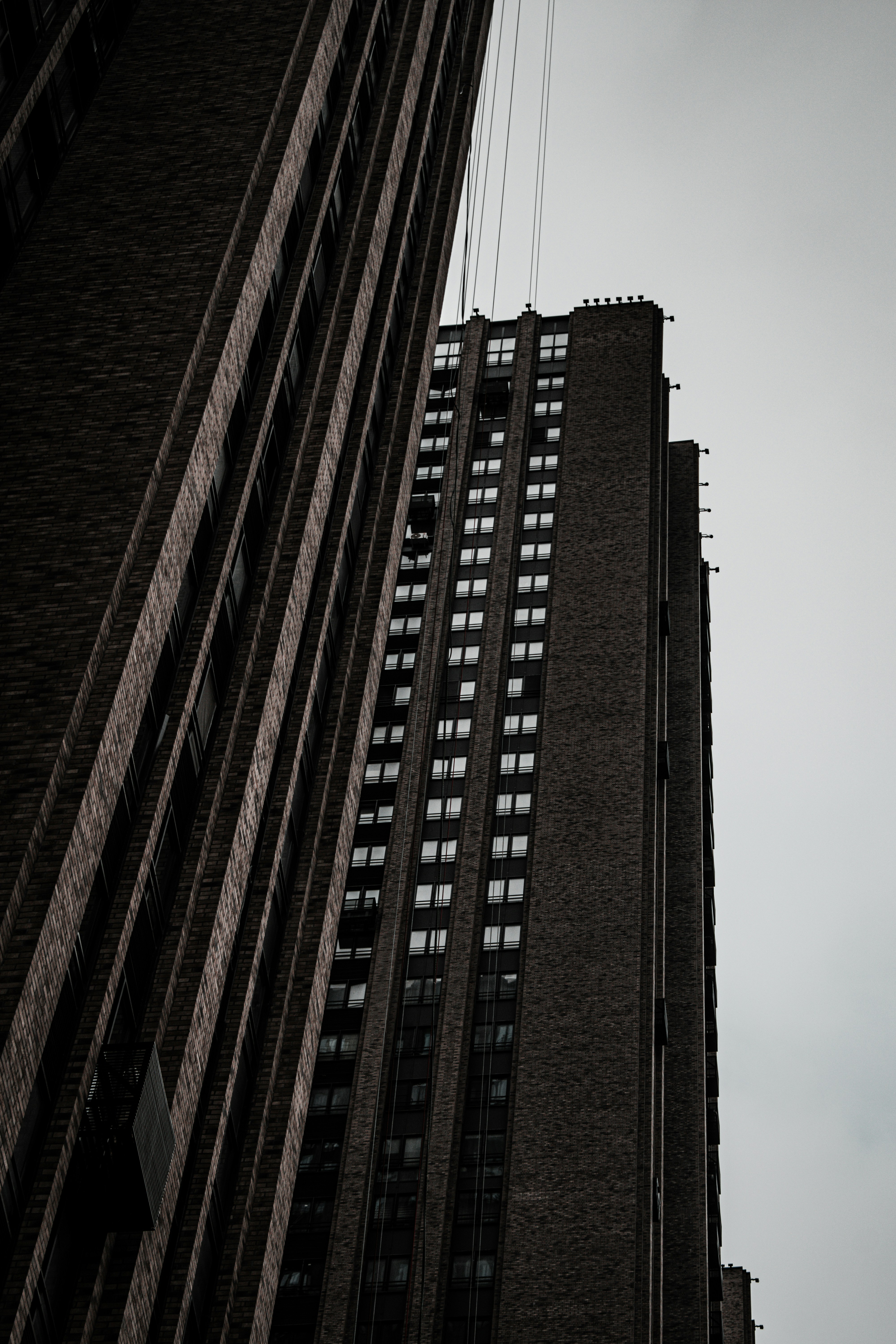 Brown concrete building during daytime photo – Free Moody skyscraper ...