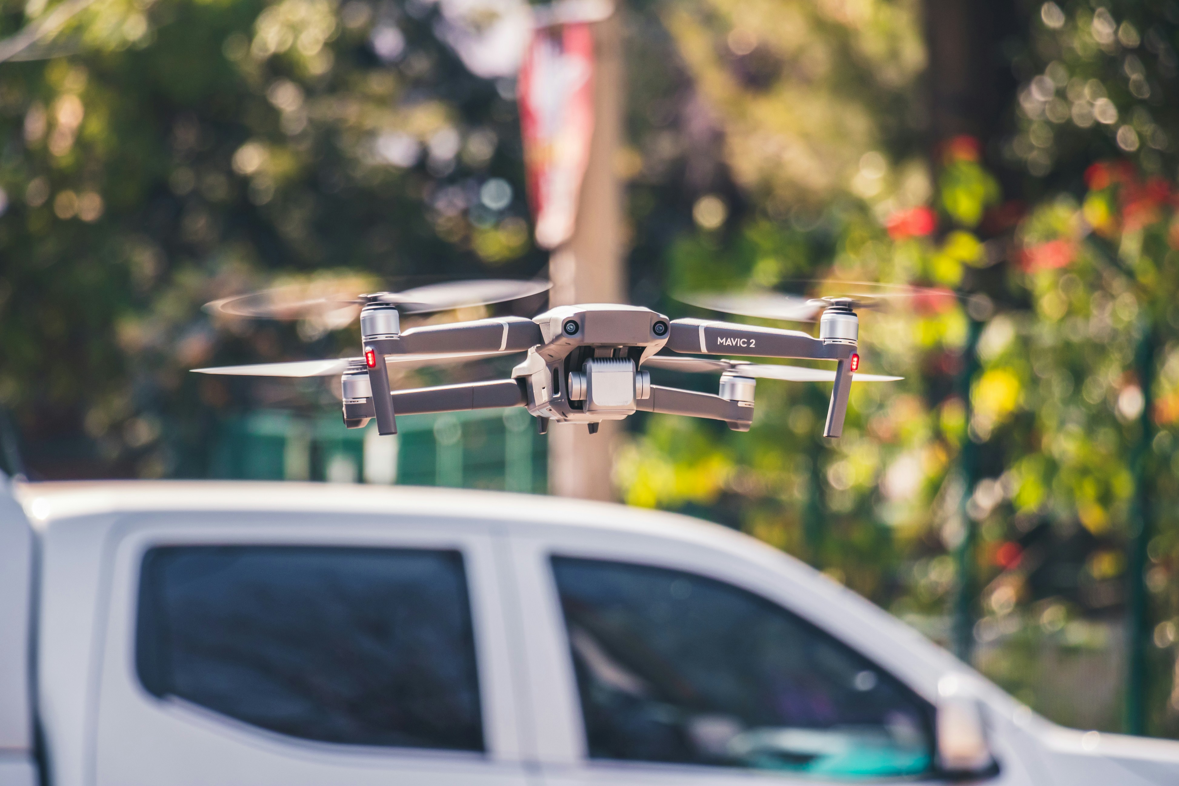 Urban Hover: A Pocket Drone Dances Over a Quiet Street