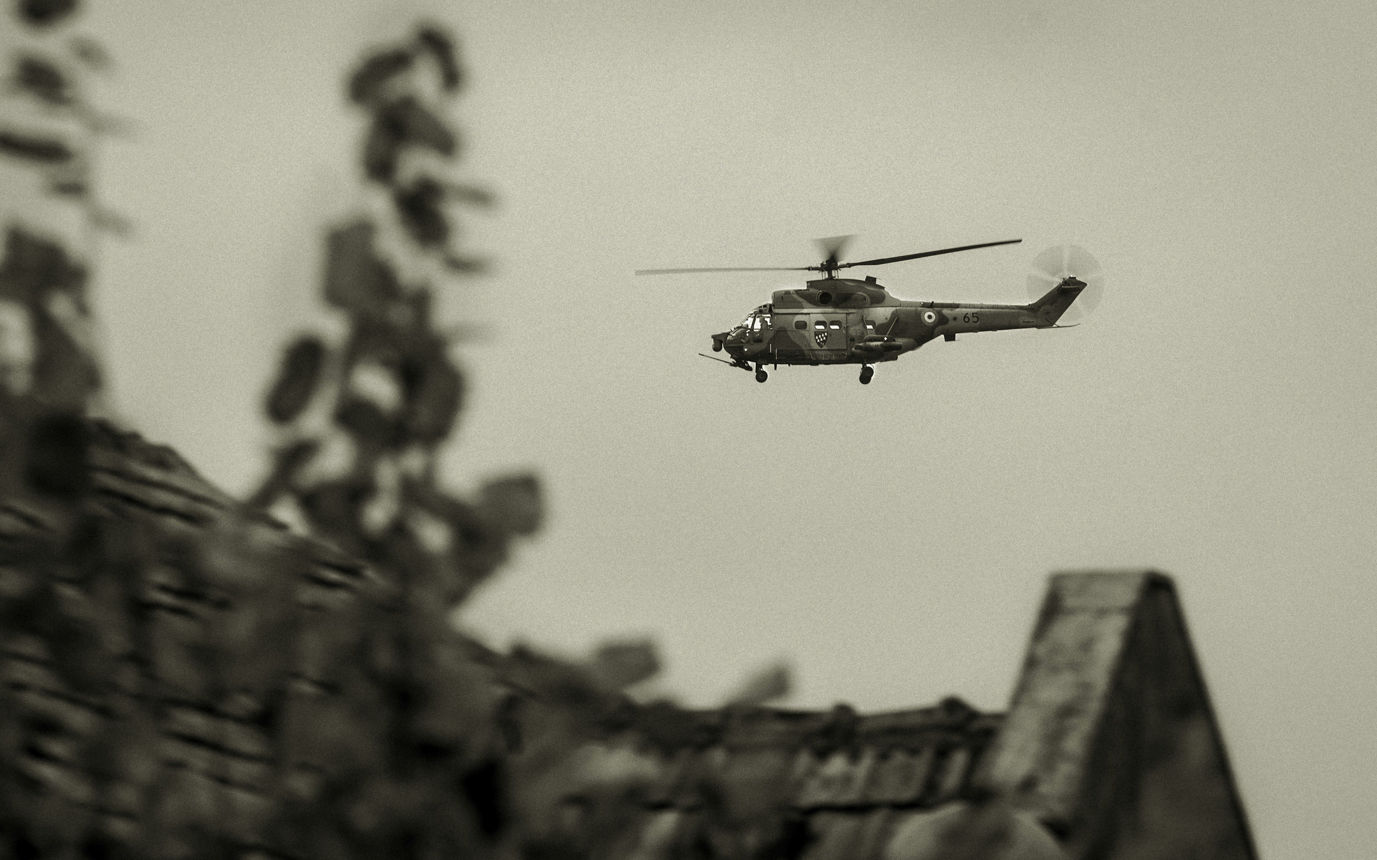 Helicopter Lift Over the Rooftop Ridge