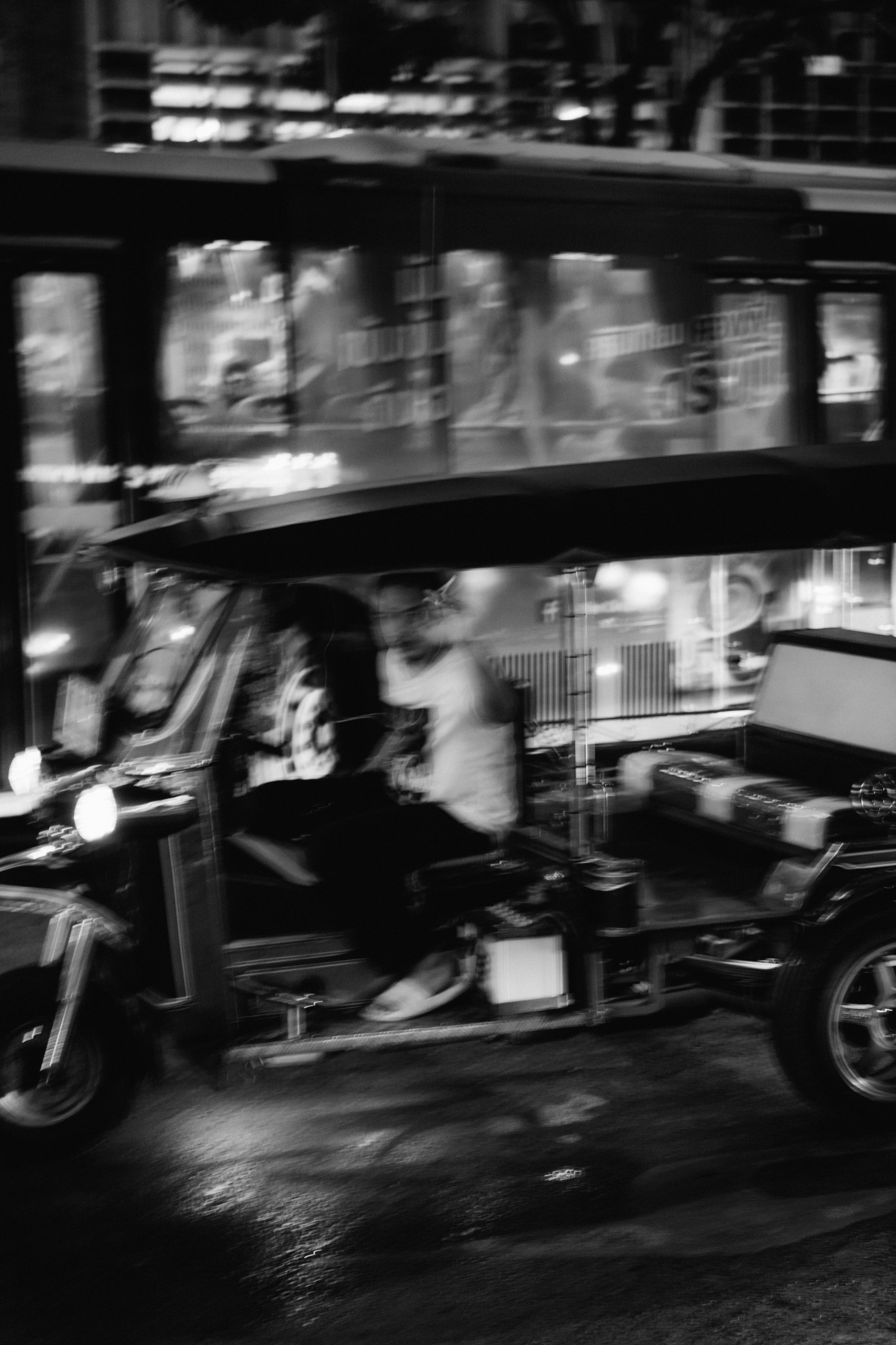 Night Shift on a Neon Tuk-Tuk: A Blur of Street Life