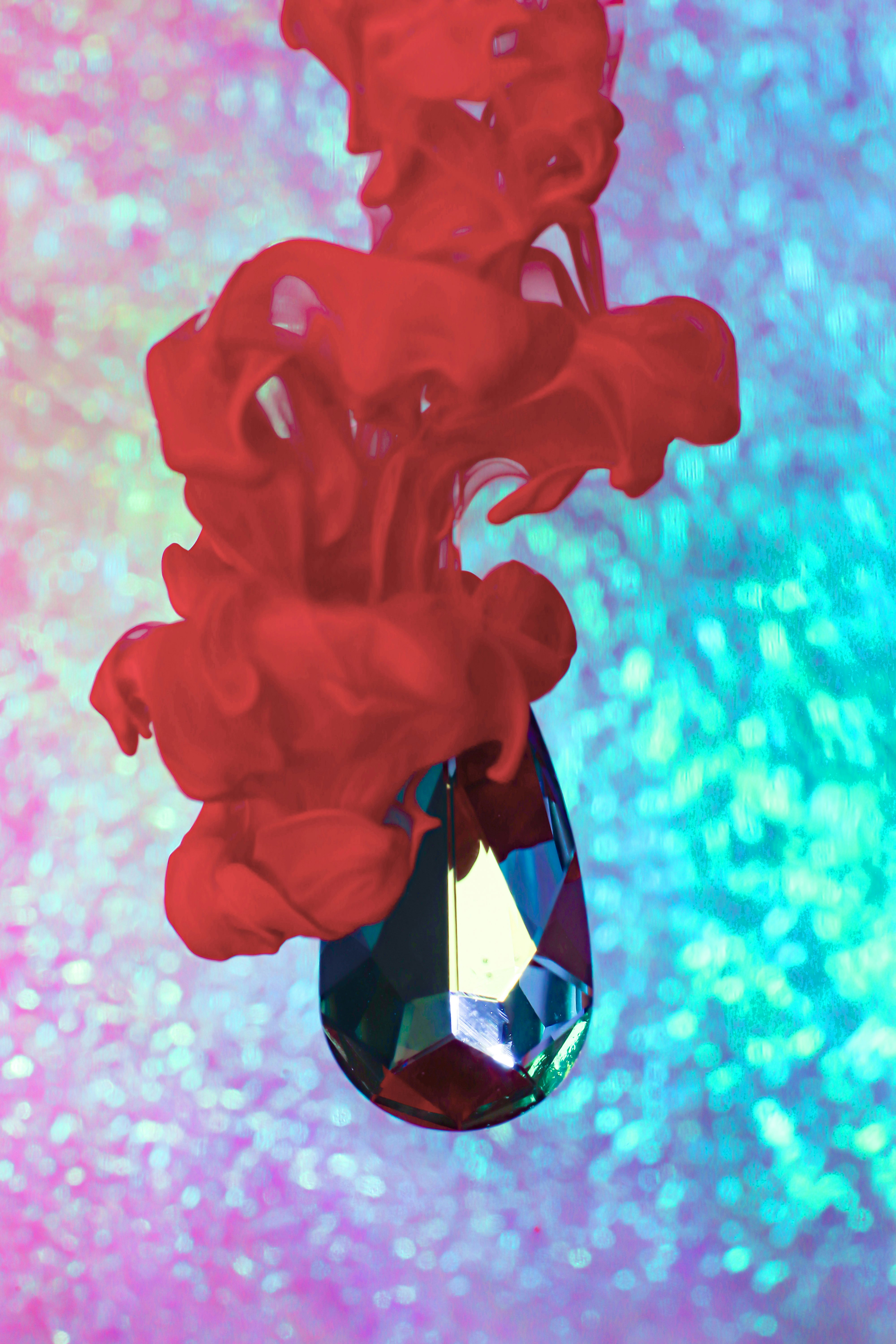 Crimson Cascade: A Gem Adrift in Colorful Mist