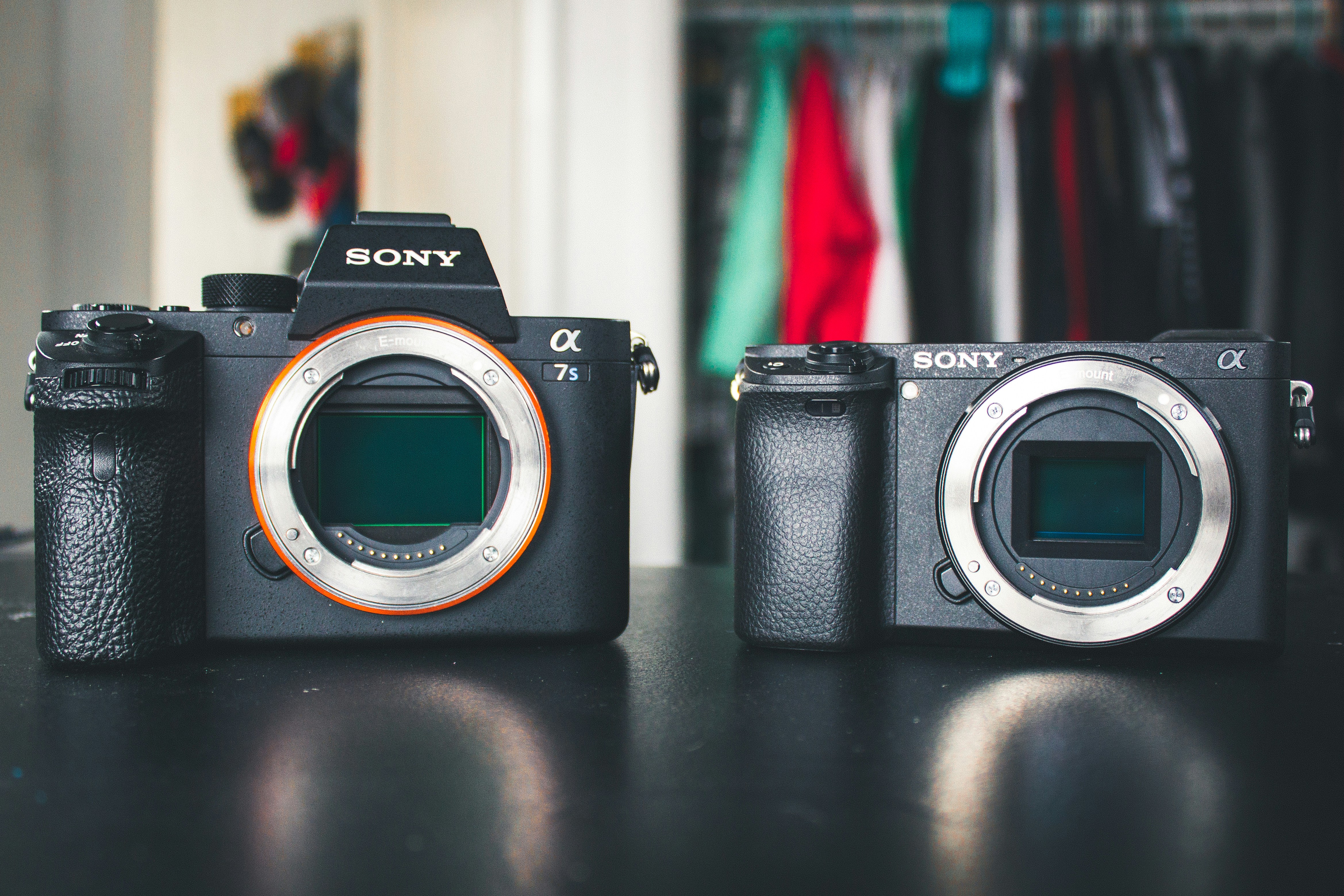 Black and silver nikon dslr camera on black table photo – Free Camera ...