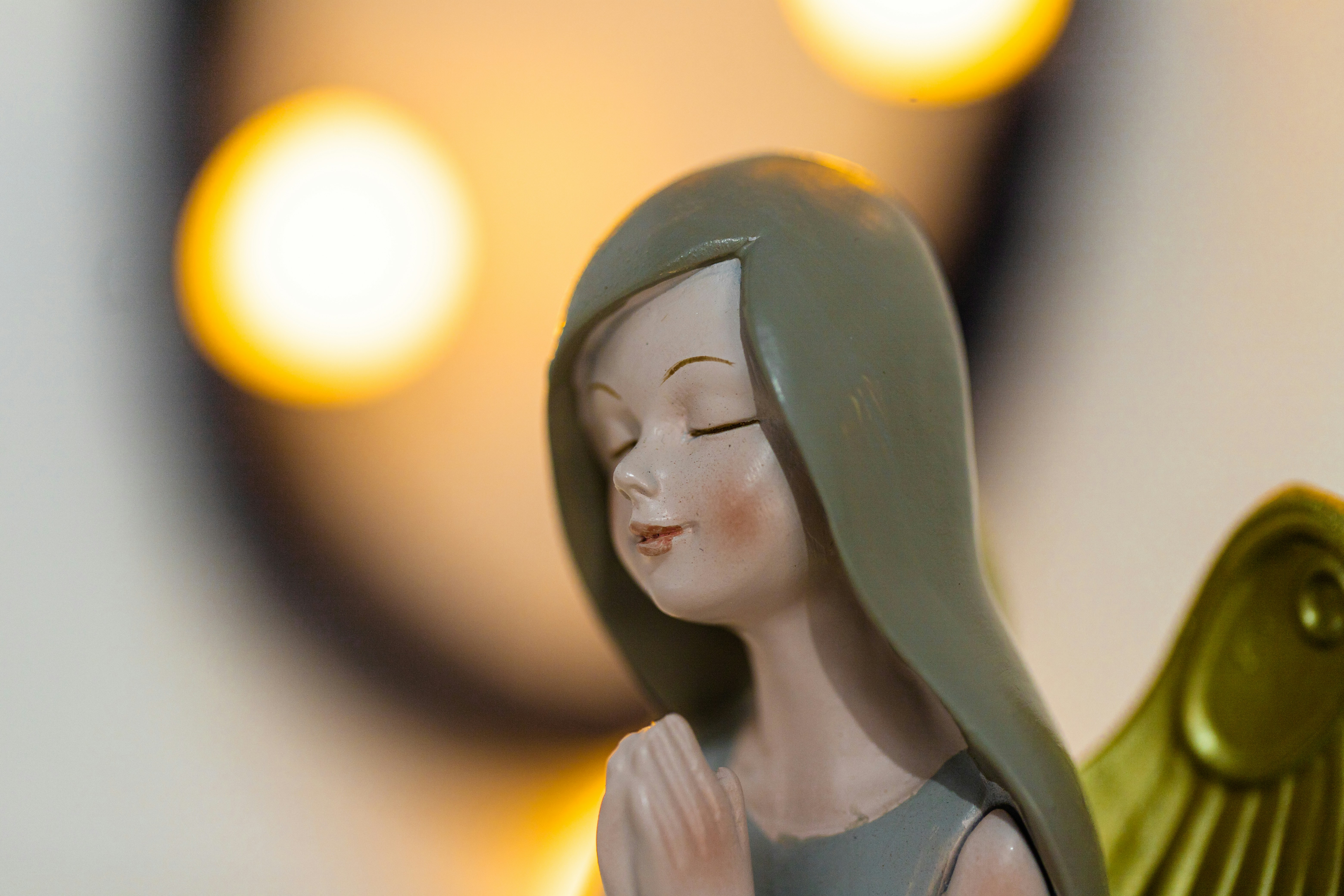 Serene Angel Figurine Amid Warm Glows