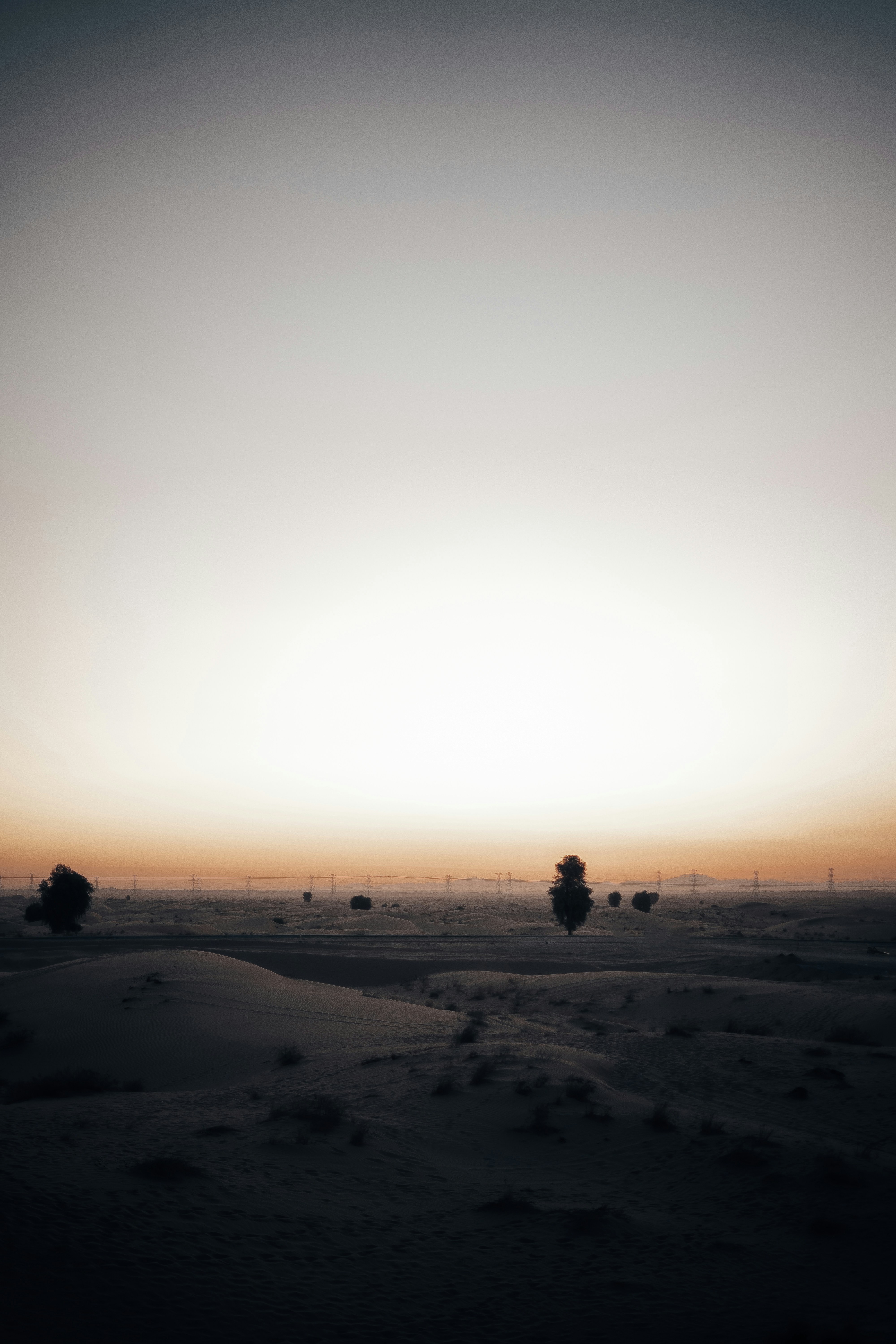 Silhouette of 2 people walking on sand during sunset photo – Free ...