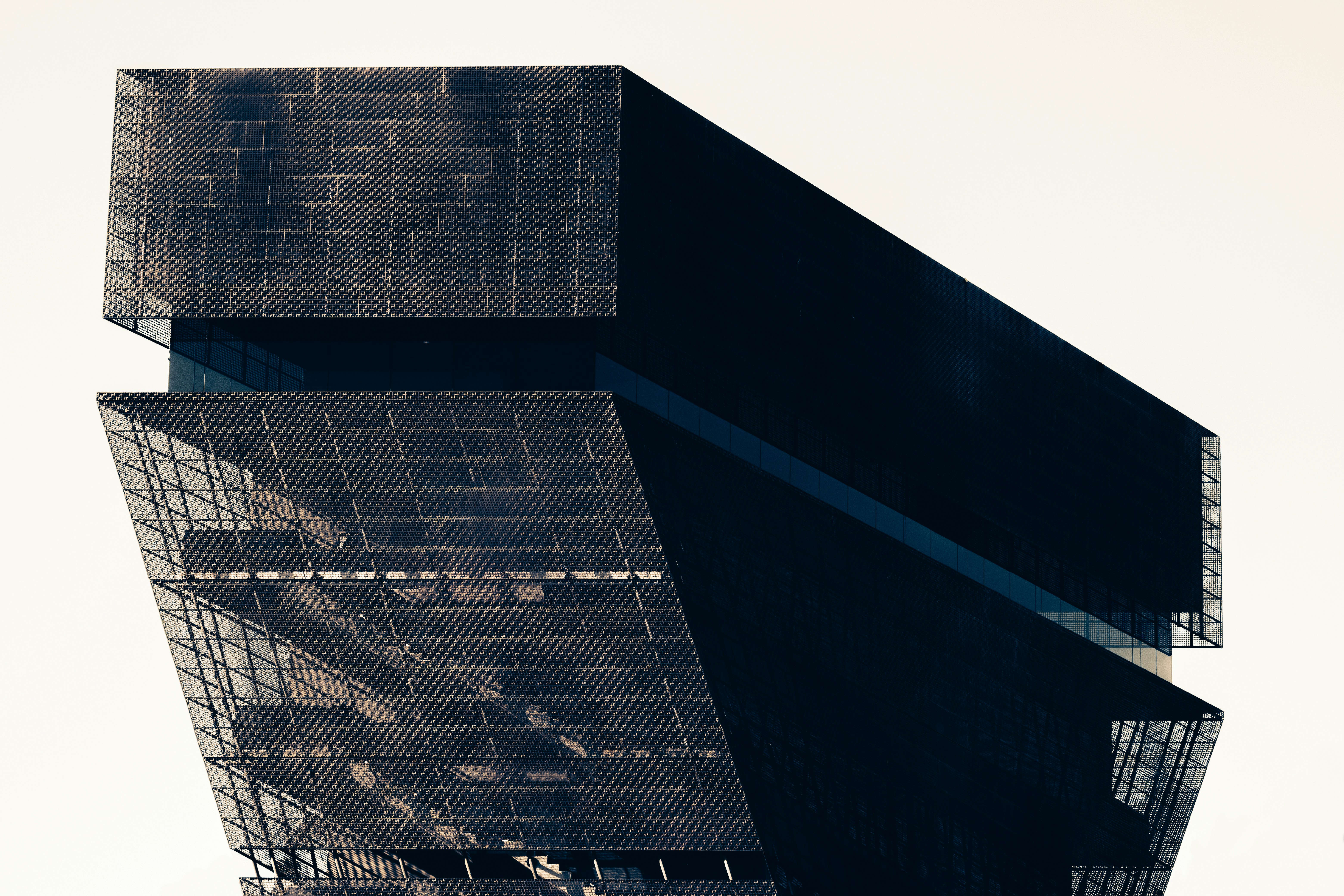 black and blue glass walled building