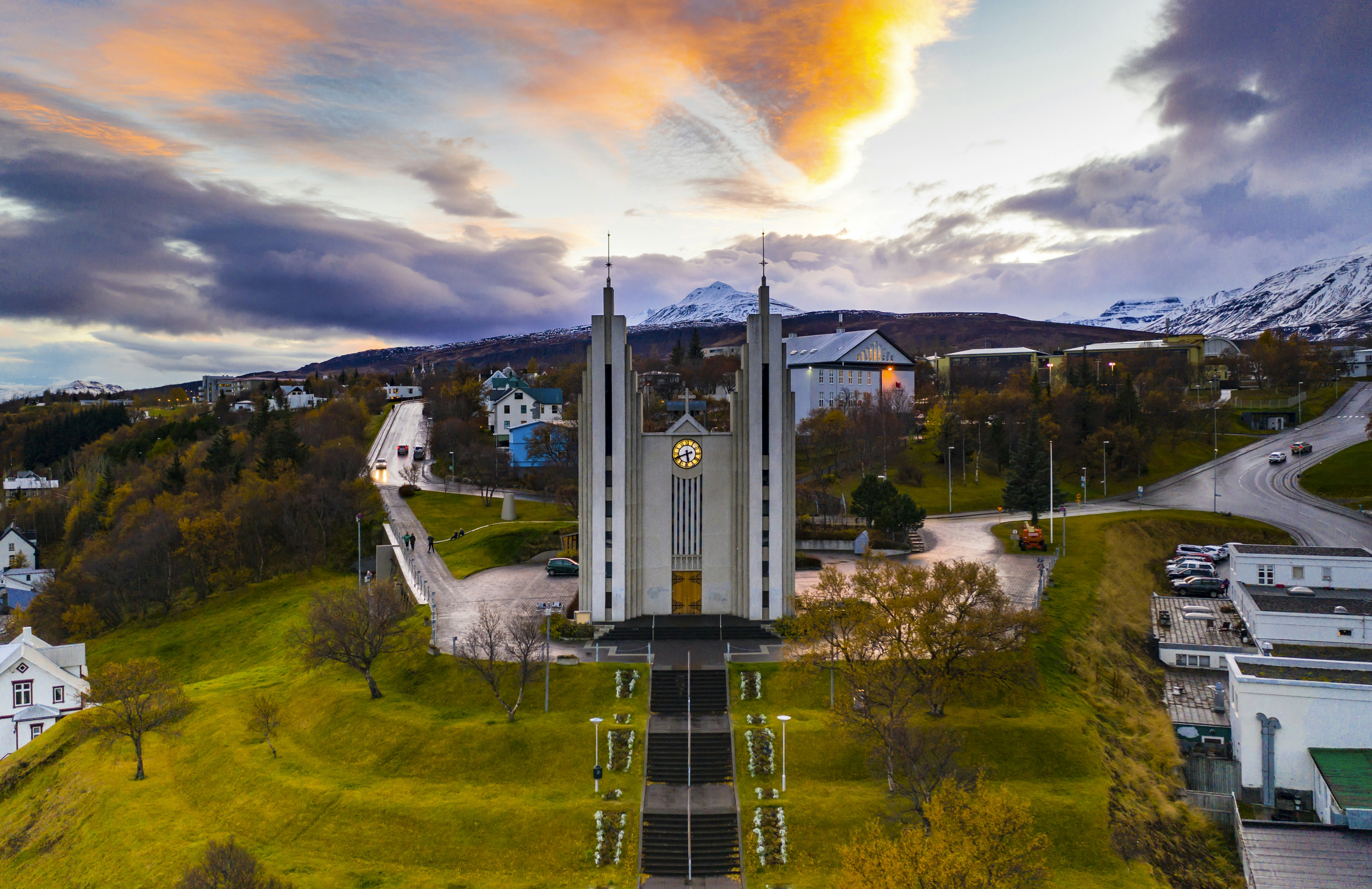 Ascending Temple: Aerial View of the Central Cathedral Towers Rising Over a Quiet Campus
