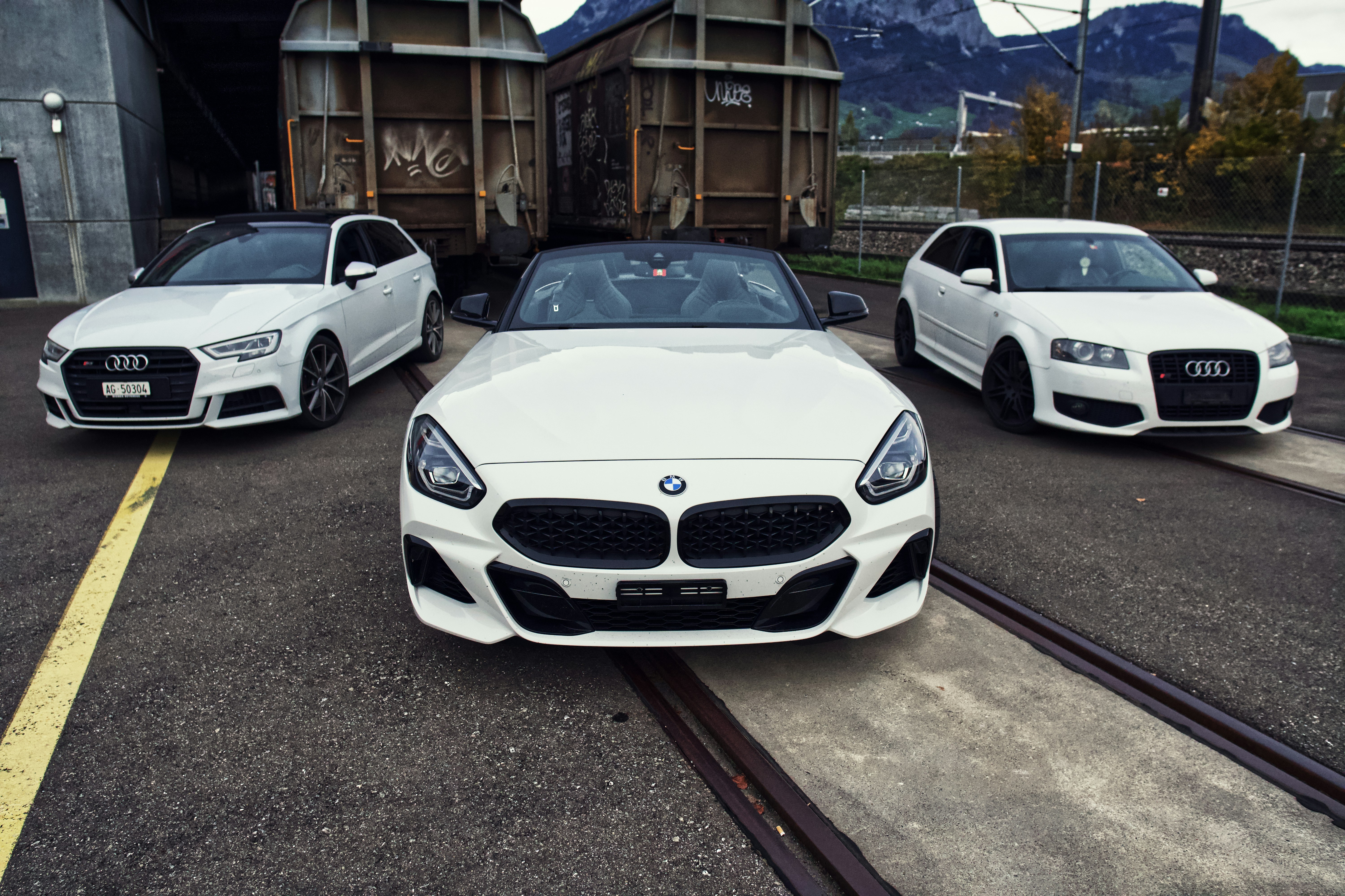 Triple Threat: Sleek White Trio by the Tracks
