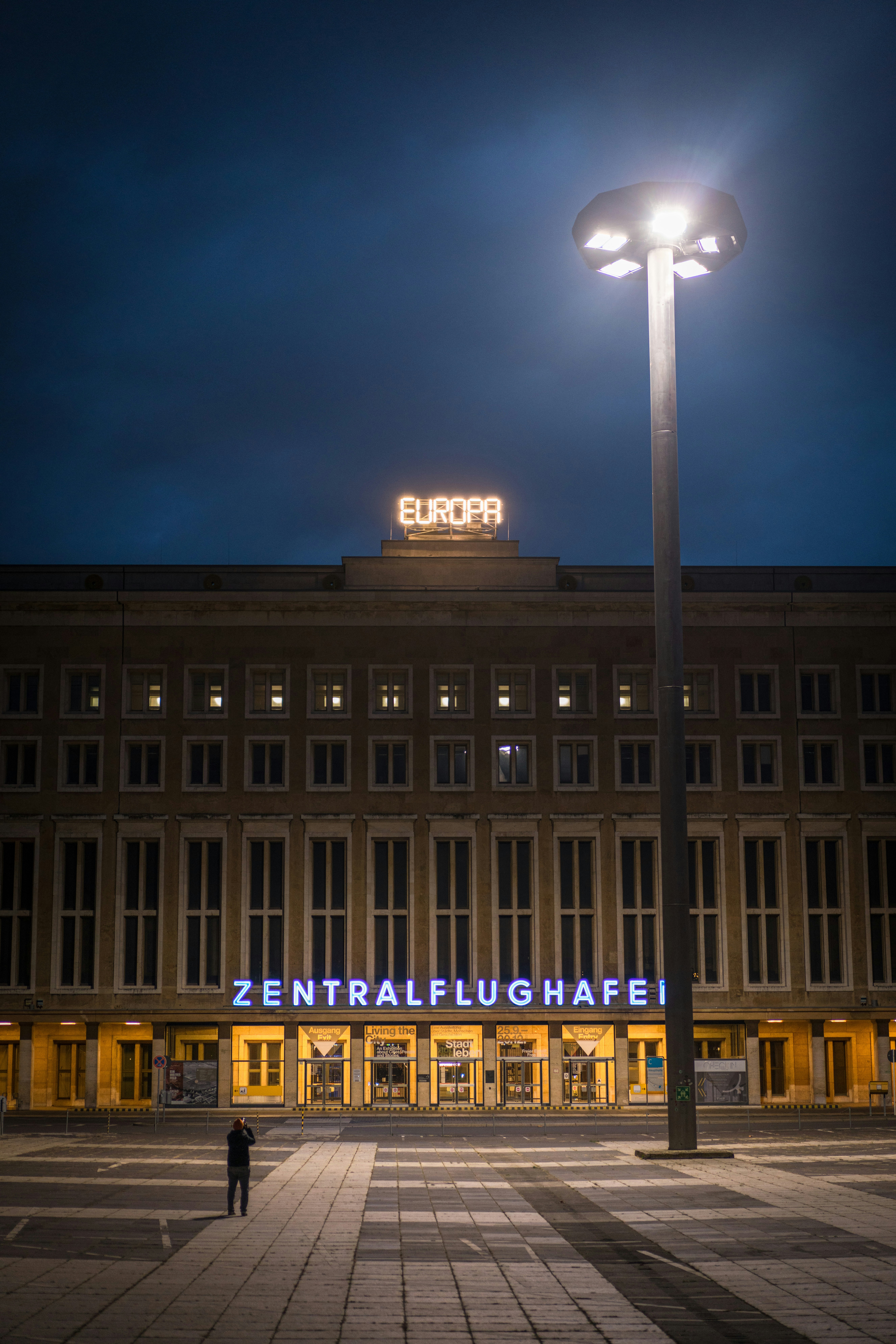 Europa Illuminates Zentralflughafen: Night Portrait of Silent Grandeur