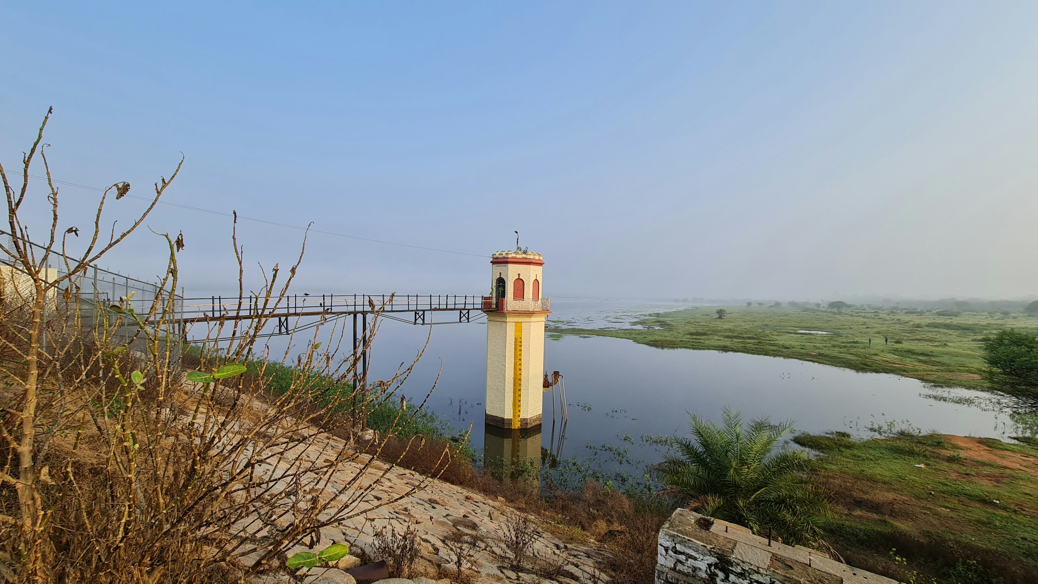 White and red lighthouse near body of water during daytime photo – Free ...