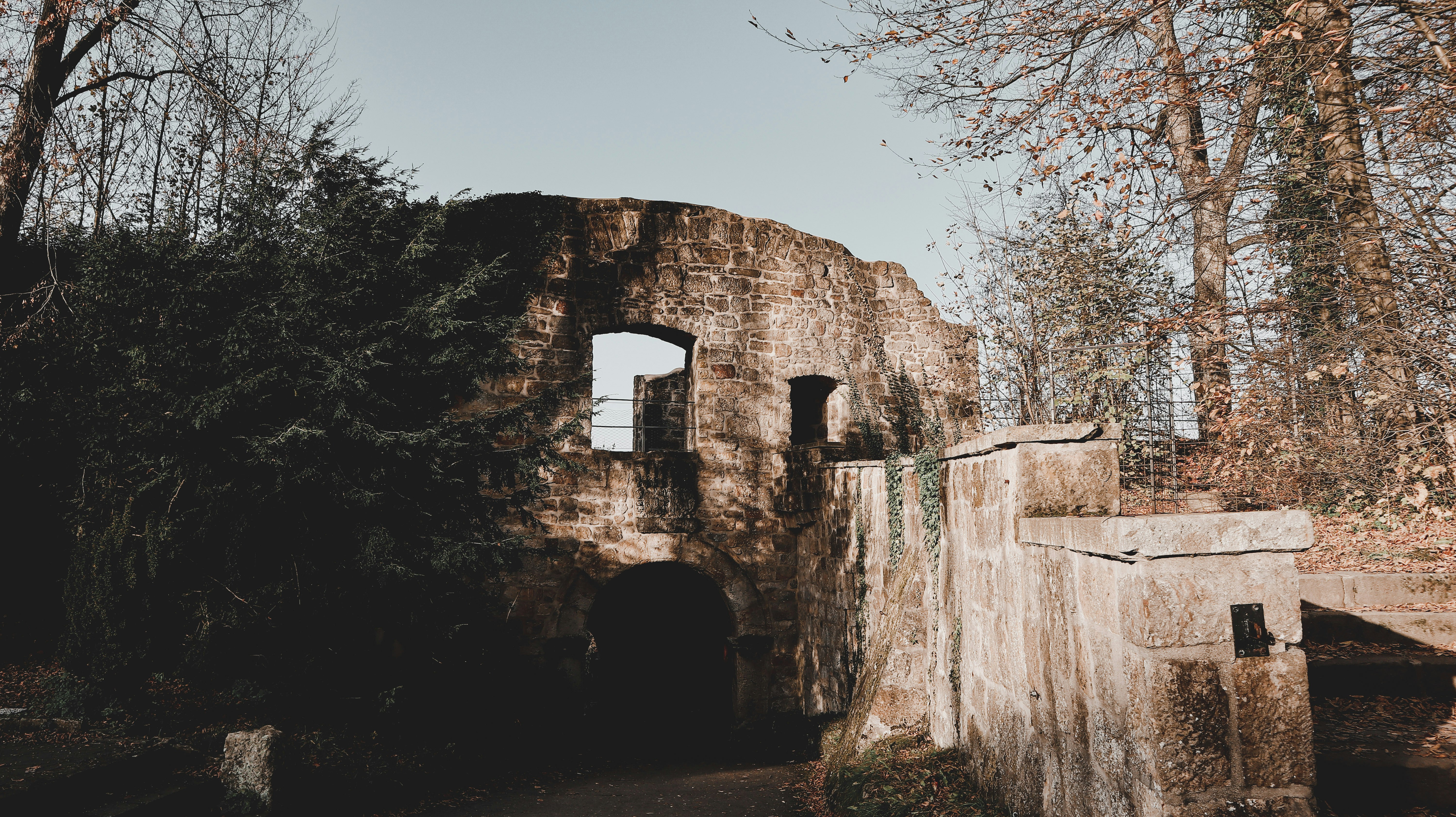Ruins Archway at Dusk: Light Weaving Through Time