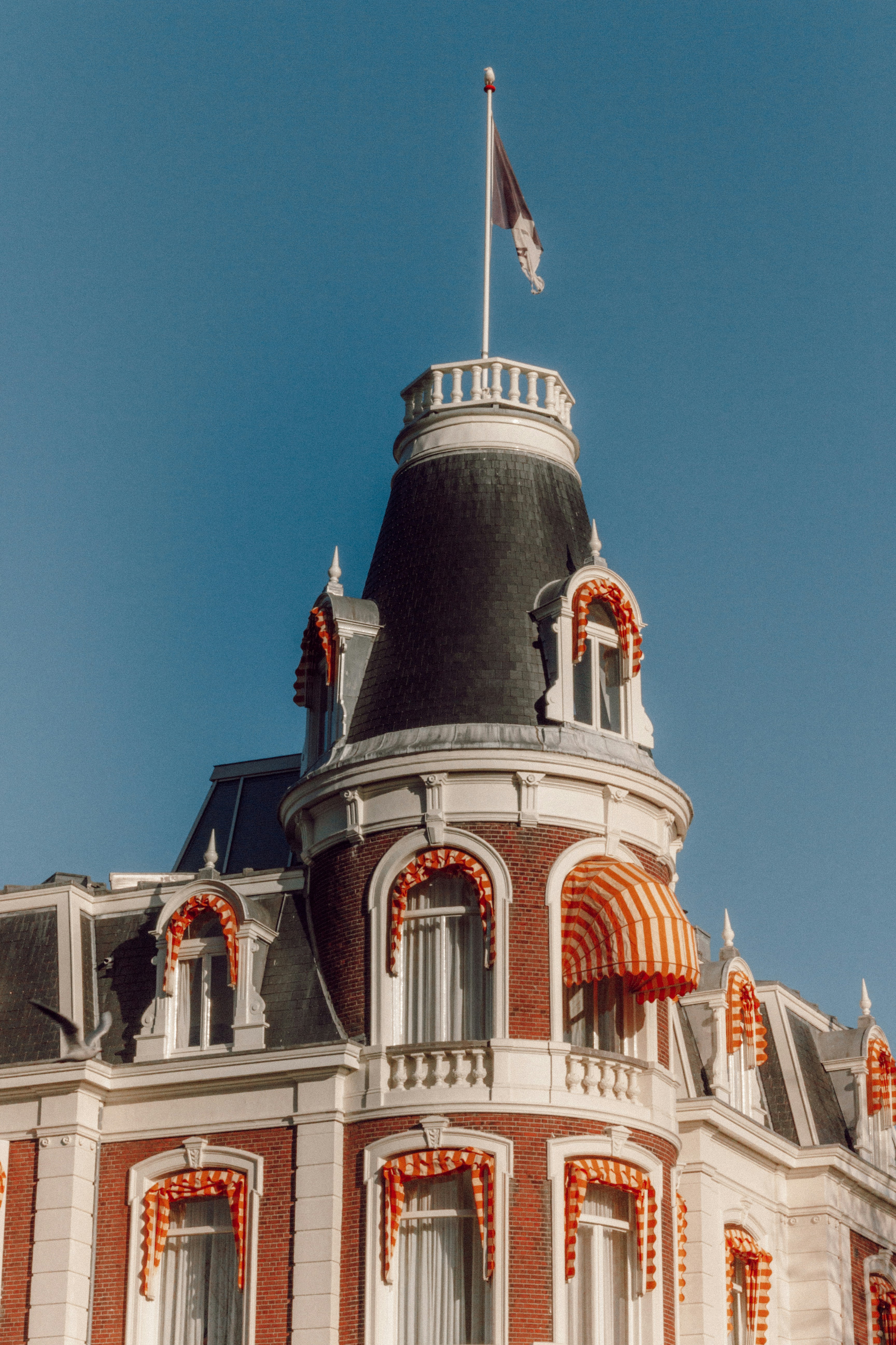 An older building right across from the Rijksmuseum in Amsterdam.