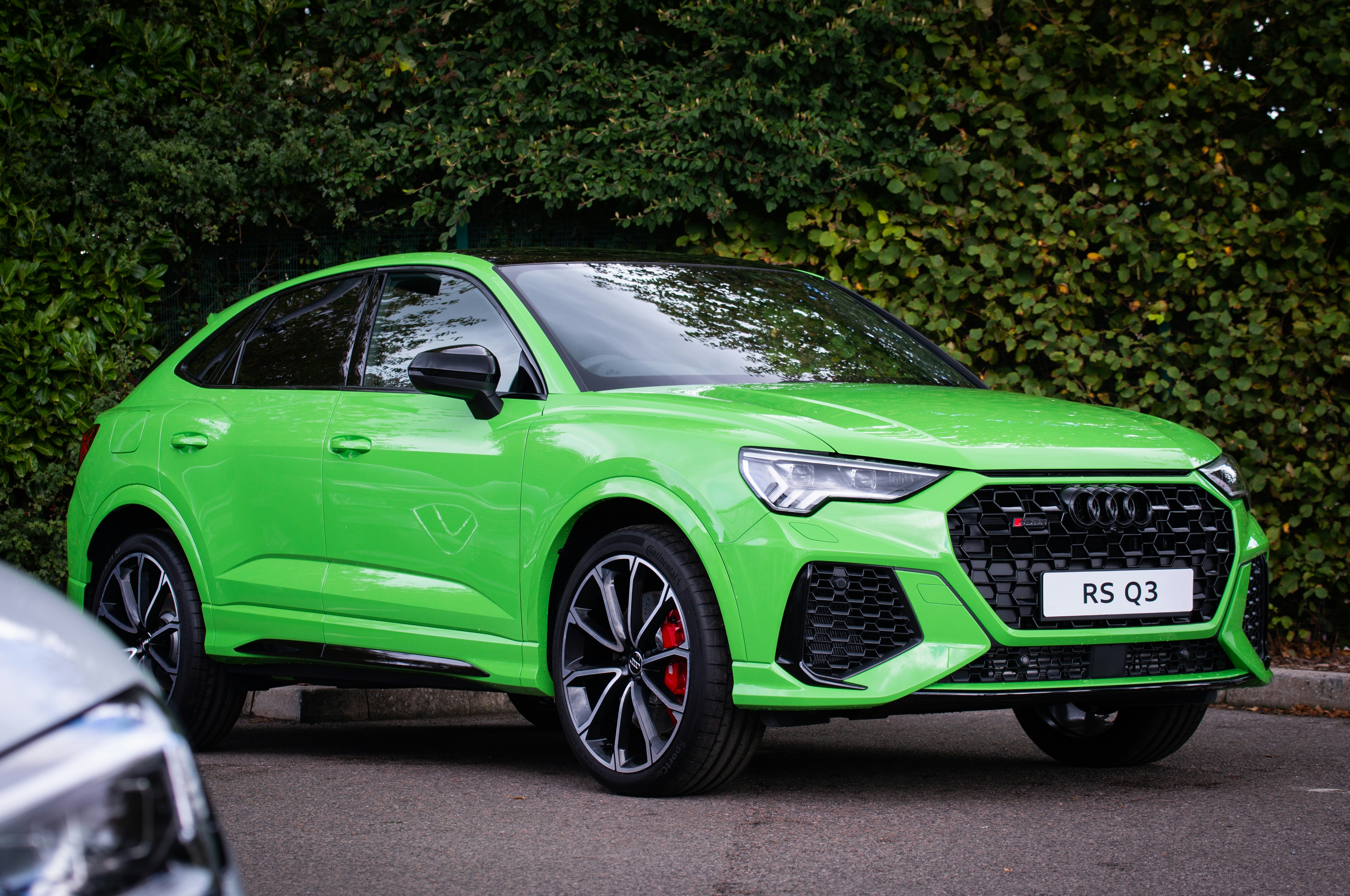 Green nissan 350 z coupe parked on gray asphalt road during daytime ...