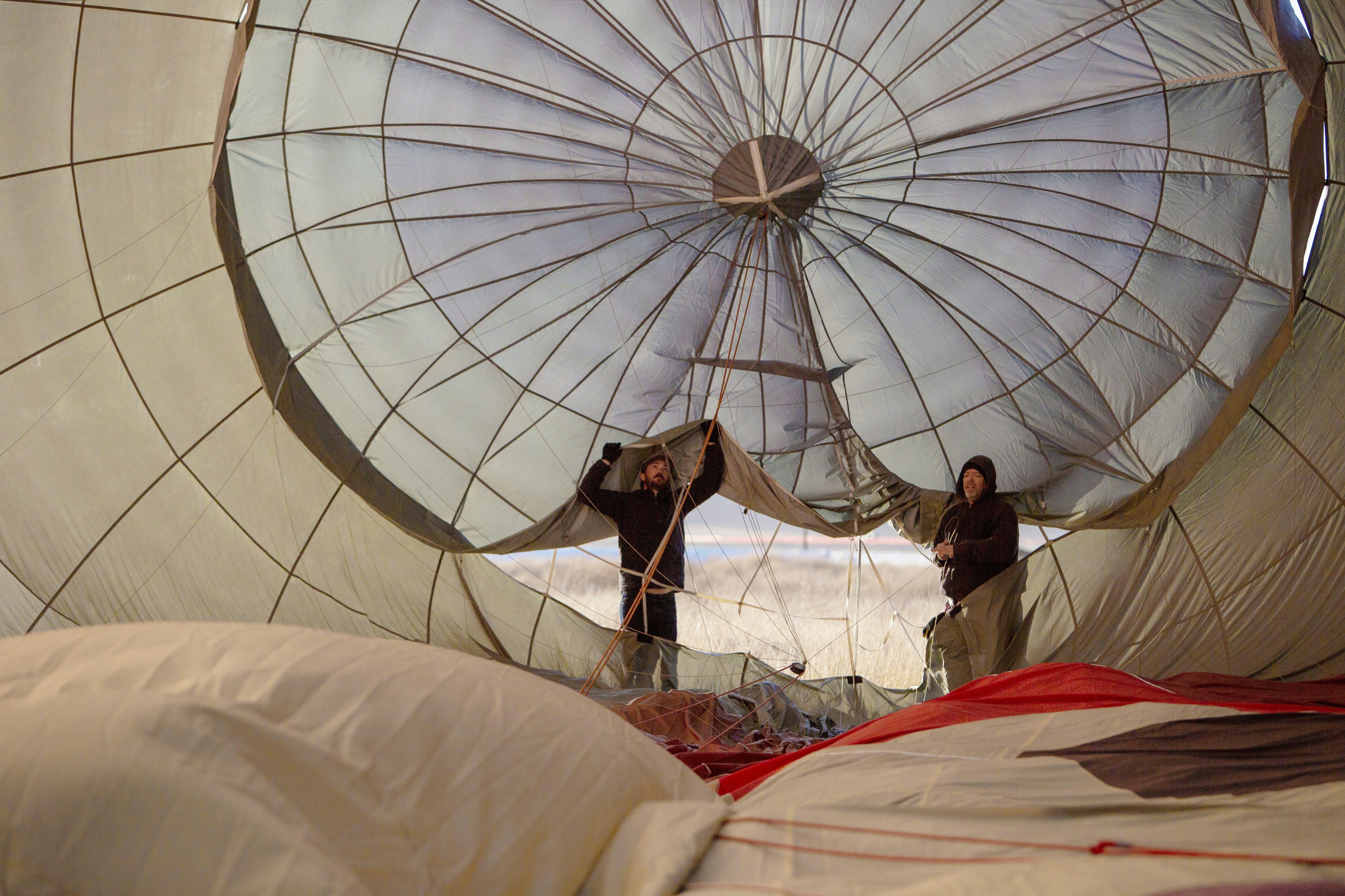 Inside the Envelope: Two Explorers Stabilize a Balloon Canopy from the Air