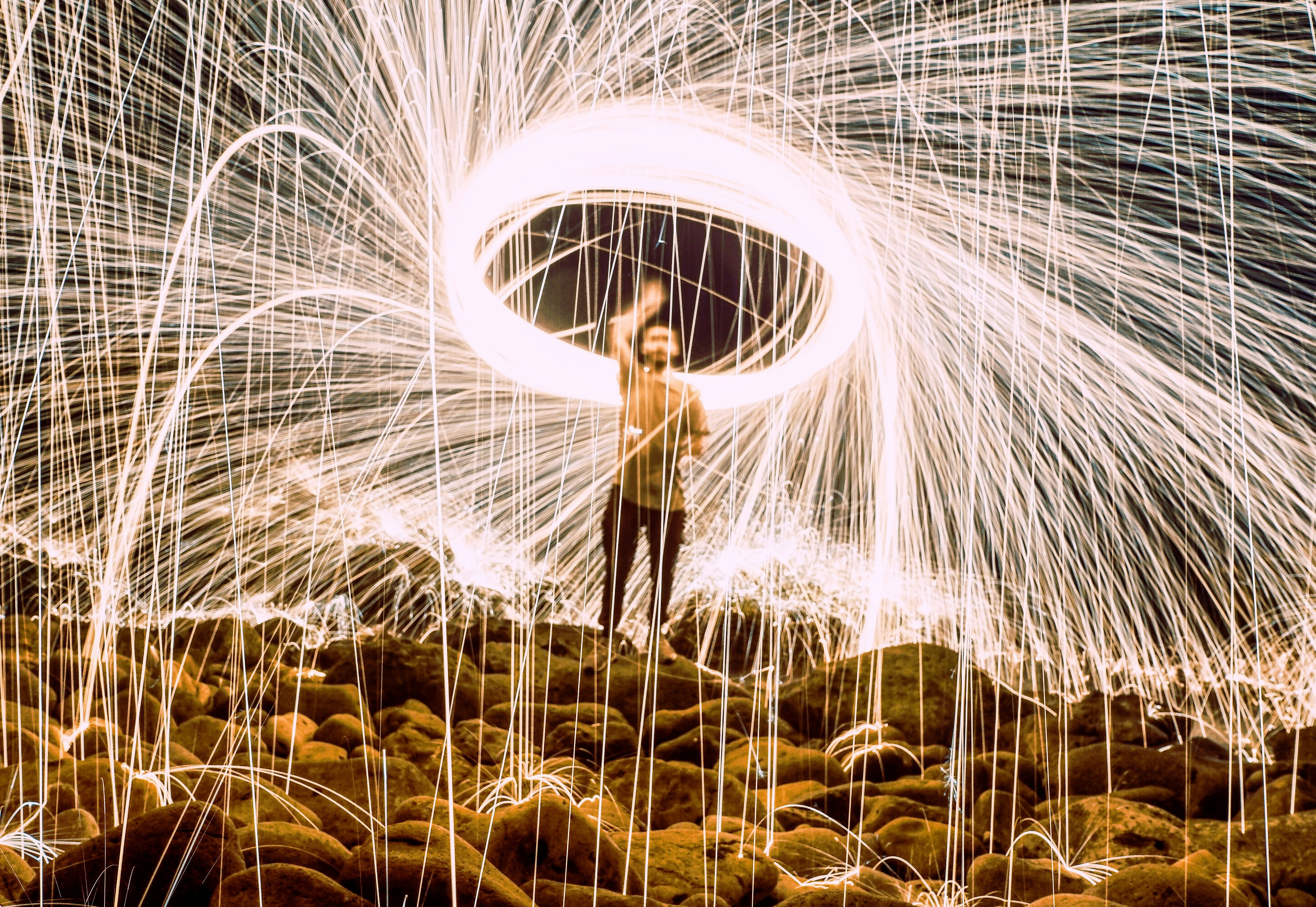 Circular Sparks: A Ring of Light Around the Shaped Shadow of a Dancer