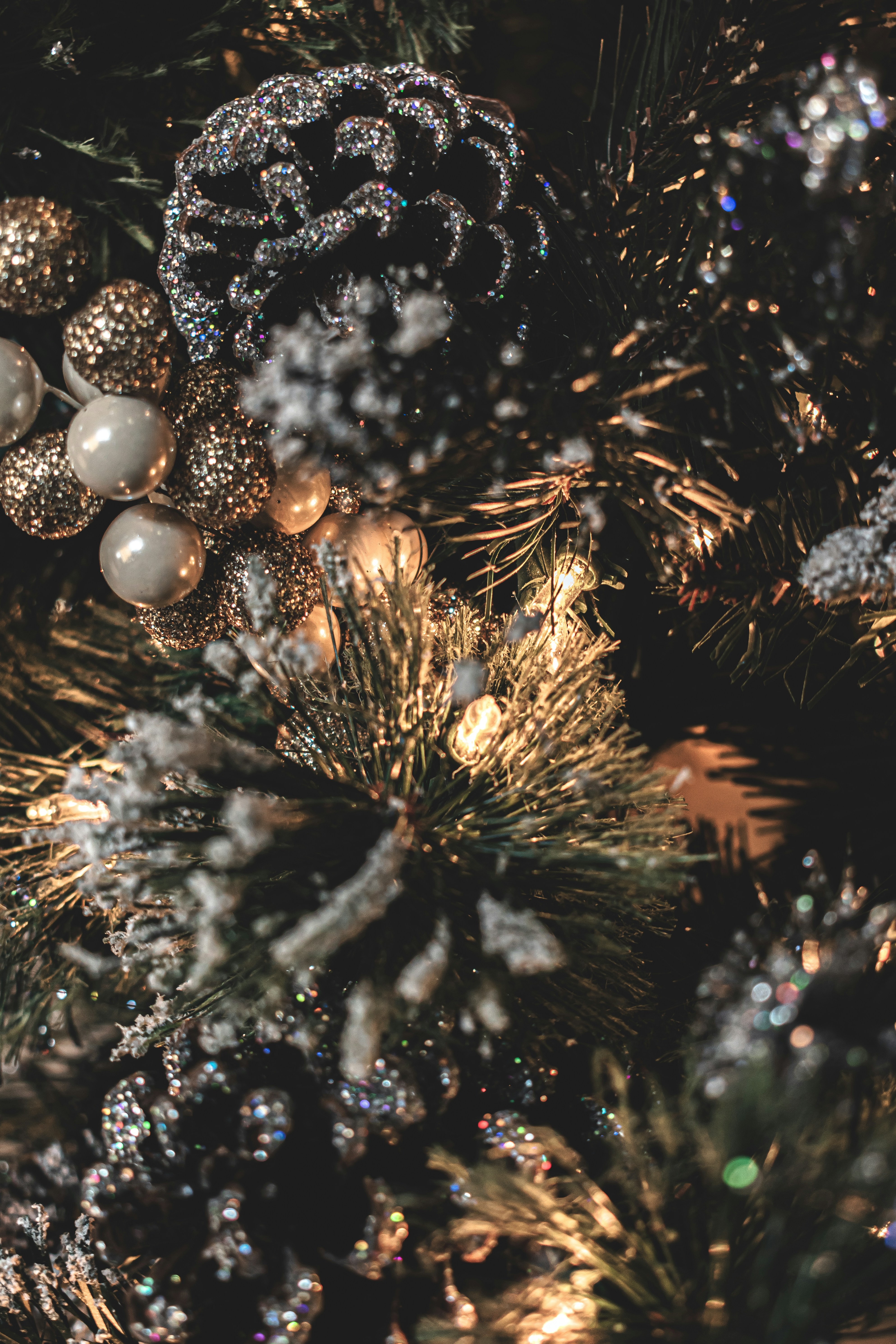 Glittering Halo Among Warm Orbs: A Close-Up on Christmas Tree Ornaments