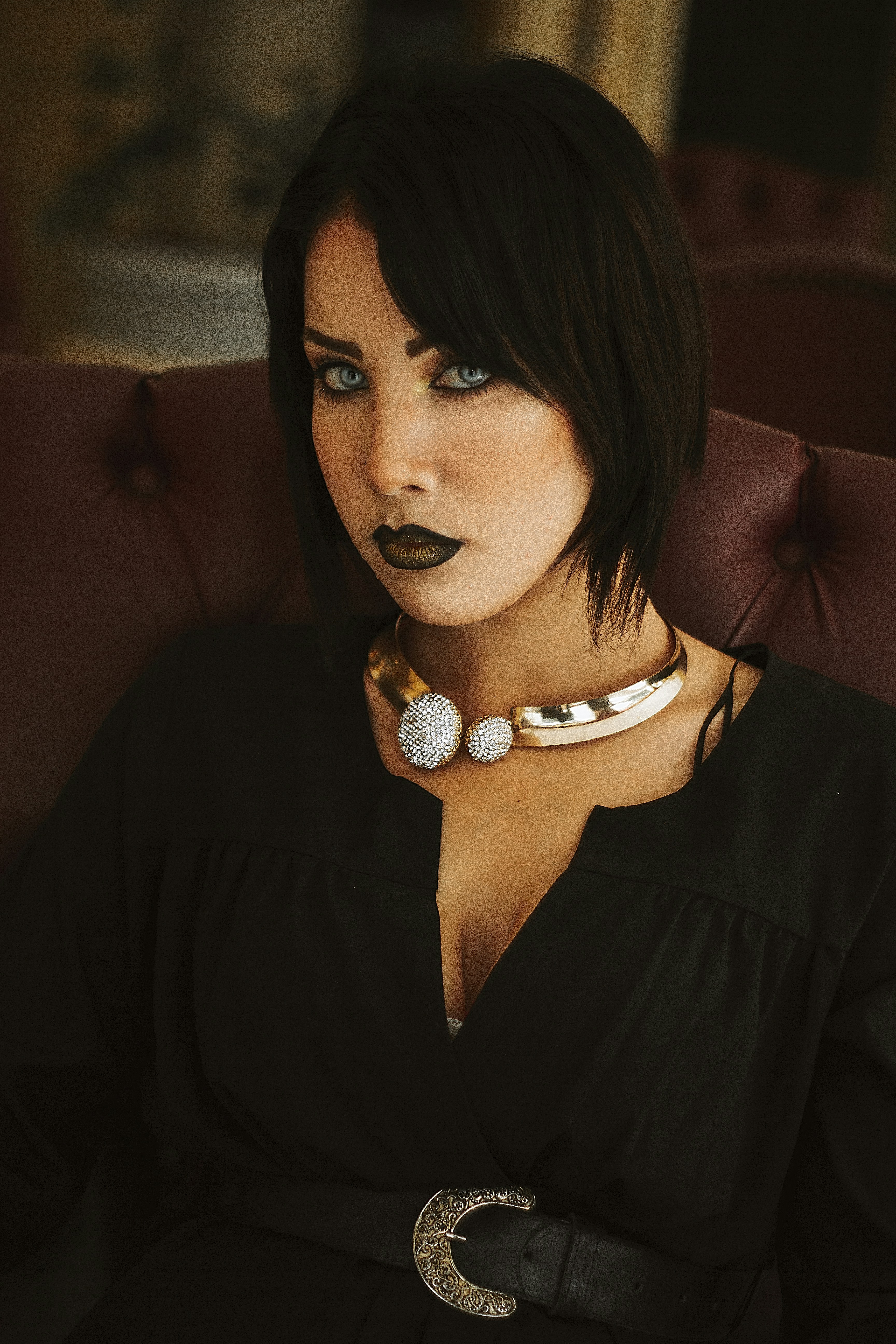 Midnight Noir: Velvet Chair Portrait with Bold Accents