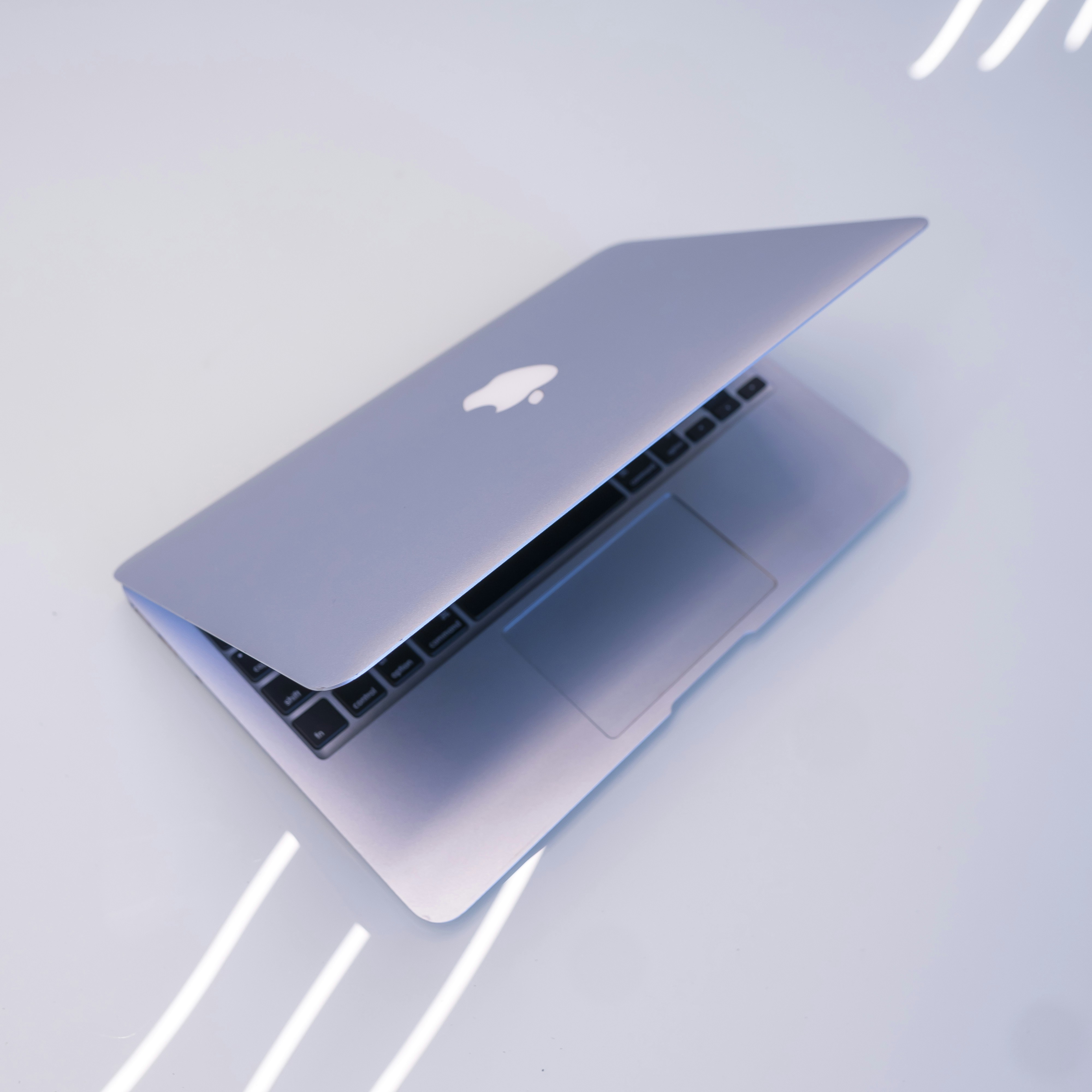 White And Blue Apple Laptop