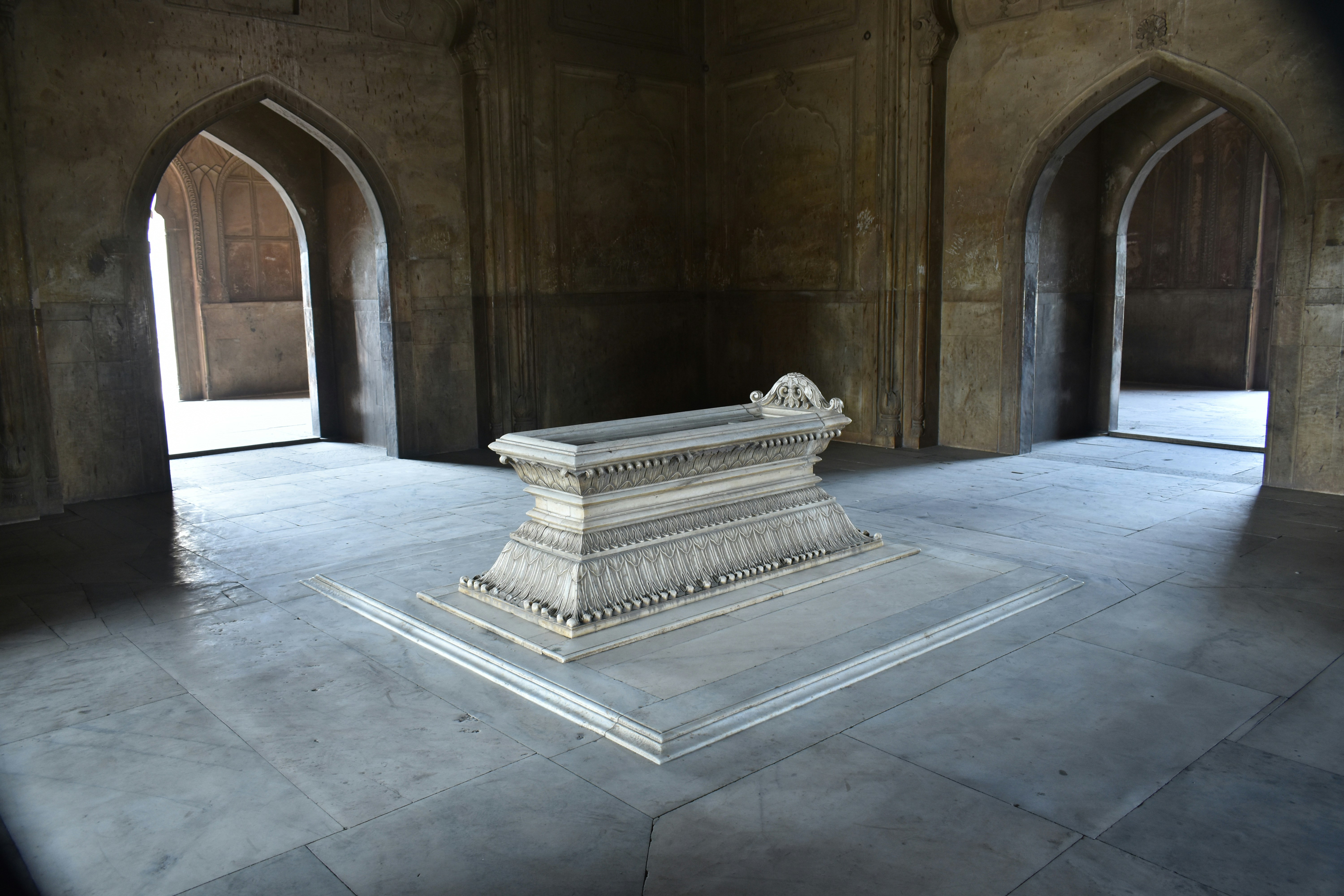 Tomb of Mirza Abul Mansur Khan, entitled "Safdarjang”,
Governor of the Mughal Ruler Mohammed Shah (1729-48 CE)  | white concrete bench inside building
