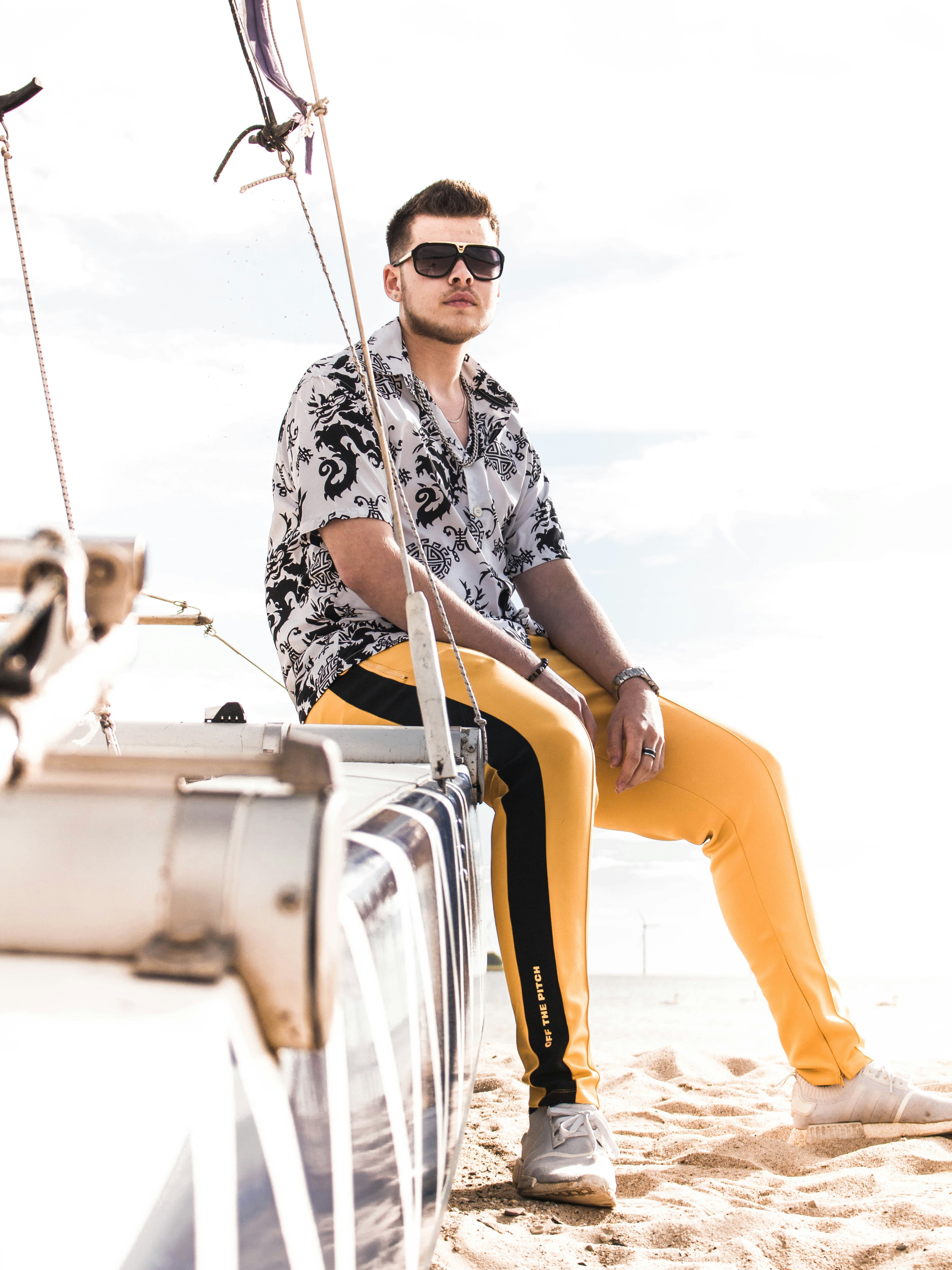 Quiet Confidence Aboard a Sunlit Beach Sailboat