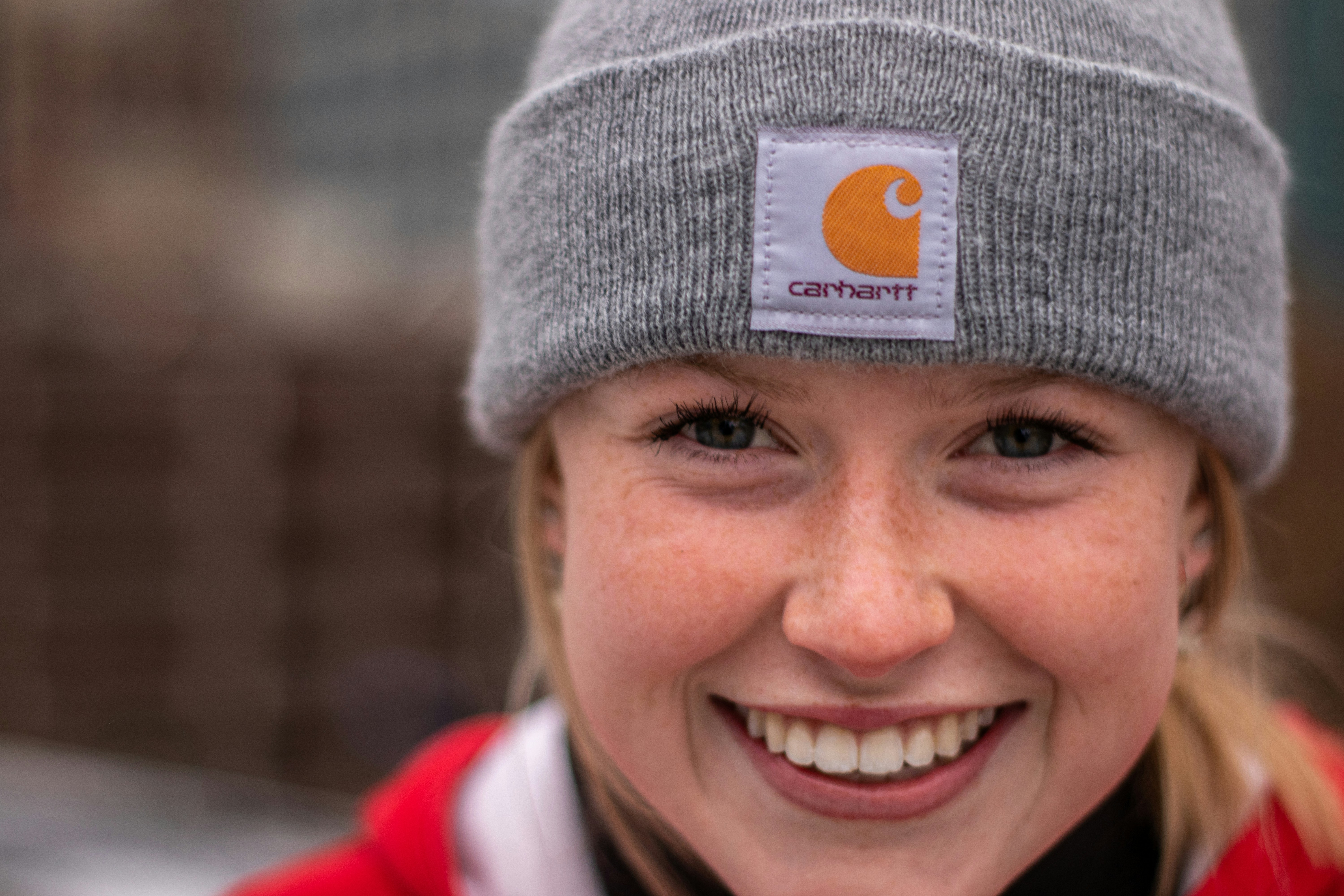 Blonde female smiling in up close portrait