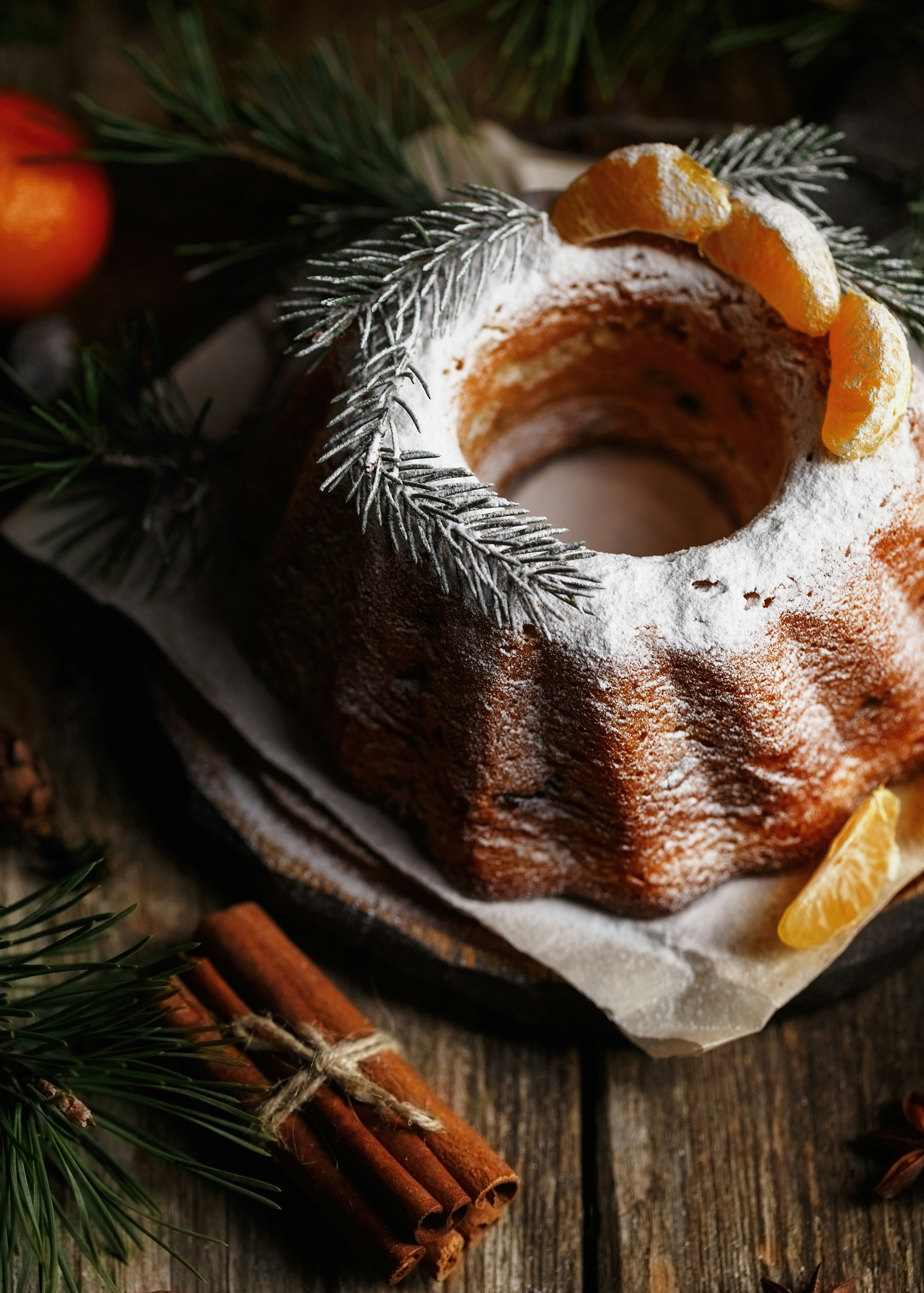 Citrus-hinted Ring Cake Nestled in Frosted Greens
