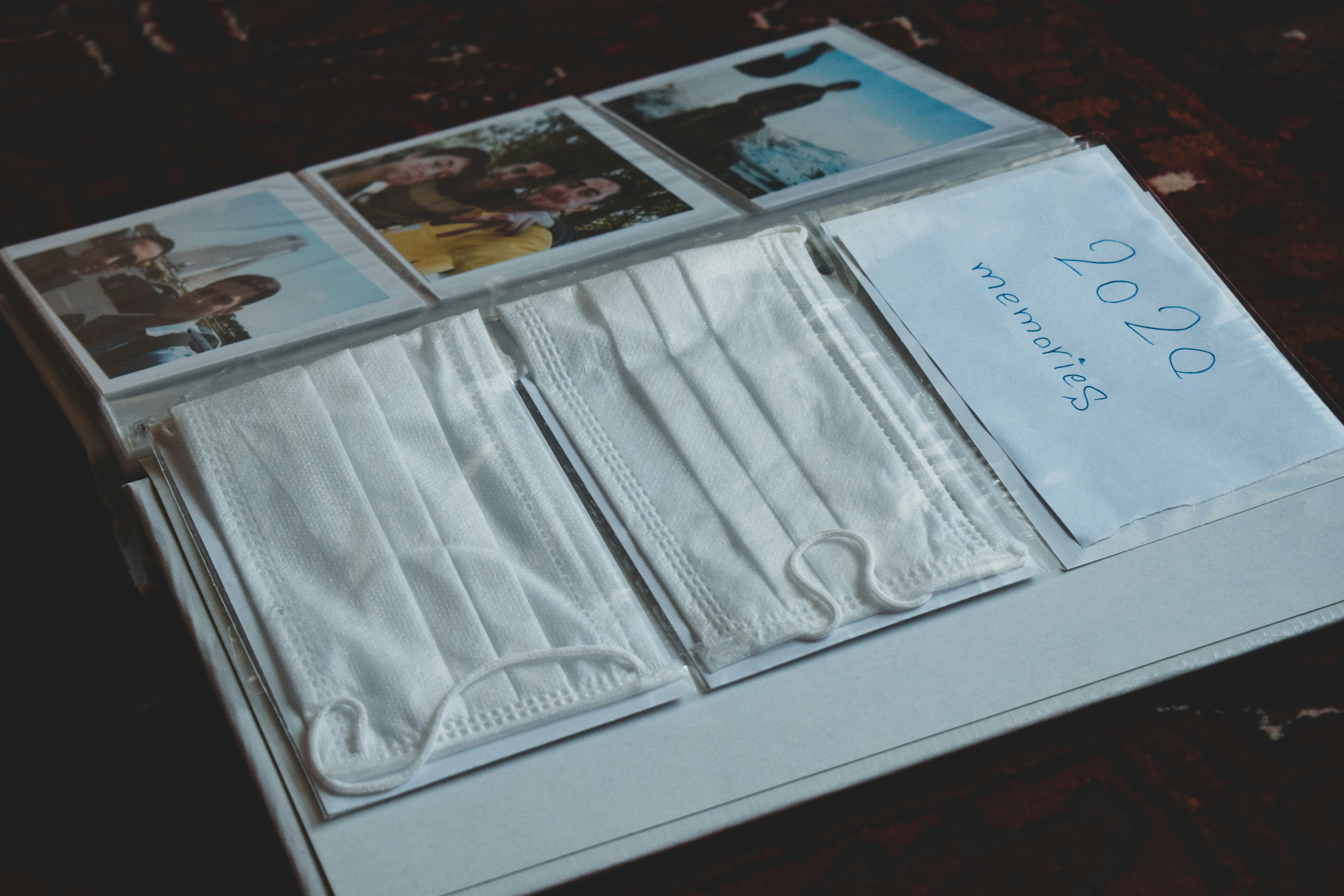 White and blue book on black table photo – Free Memories Image on Unsplash
